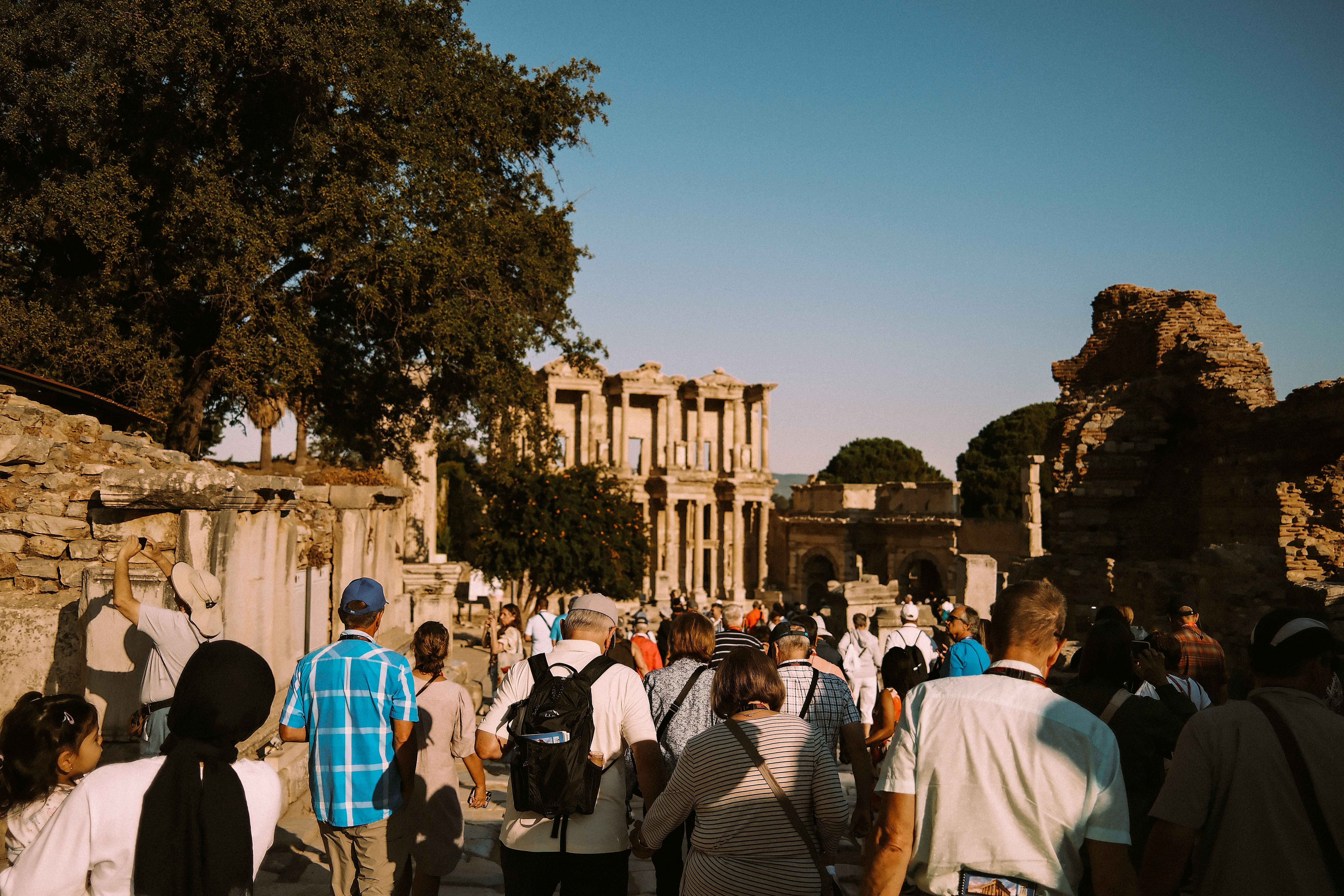Tourists Exploring Ancient Ruins of Ephesus · Free Stock Photo