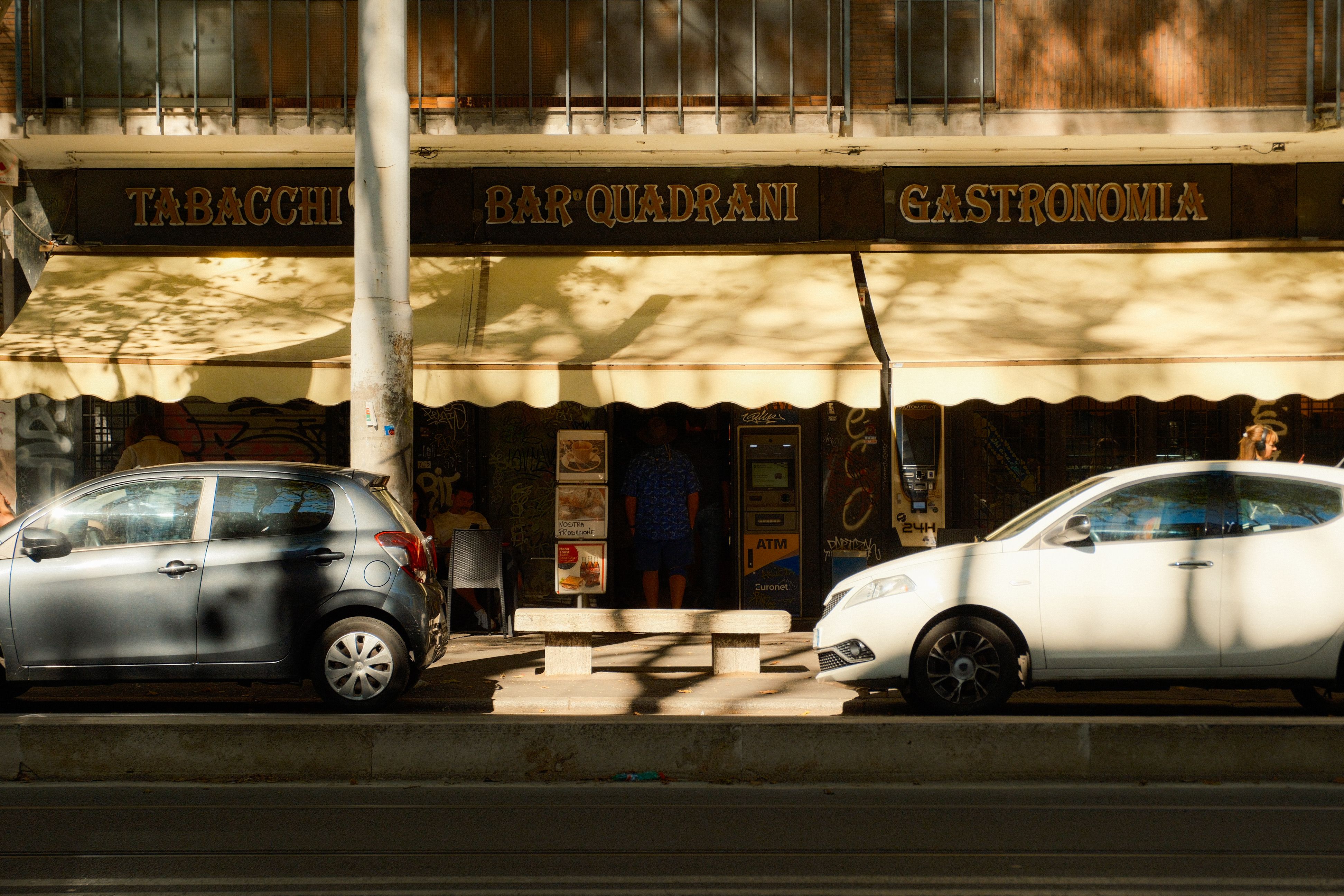 Cozy Italian Bar With Cars Parked Outside · Free Stock Photo