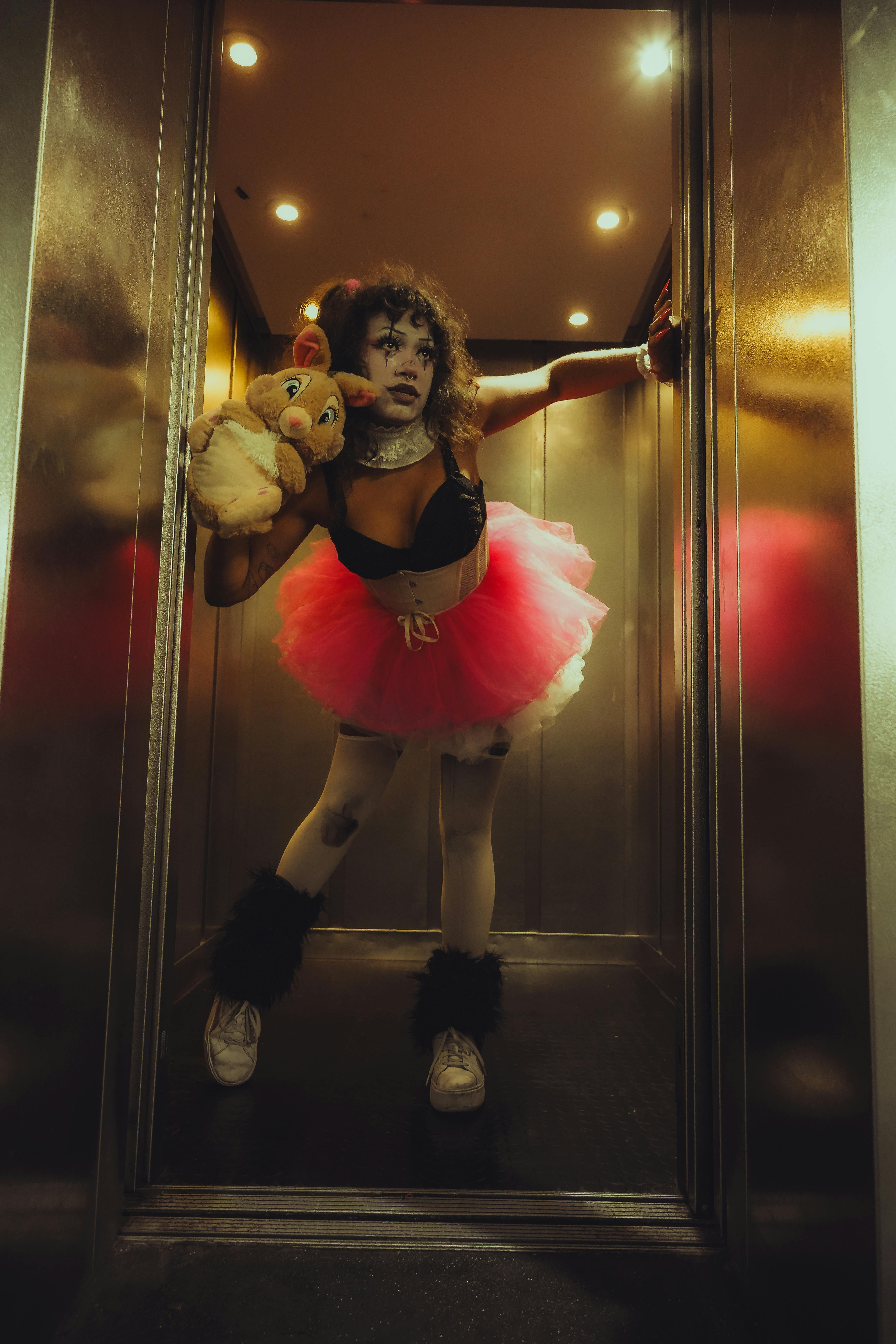 Creepy Clown in Elevator with Halloween Makeup · Free Stock Photo