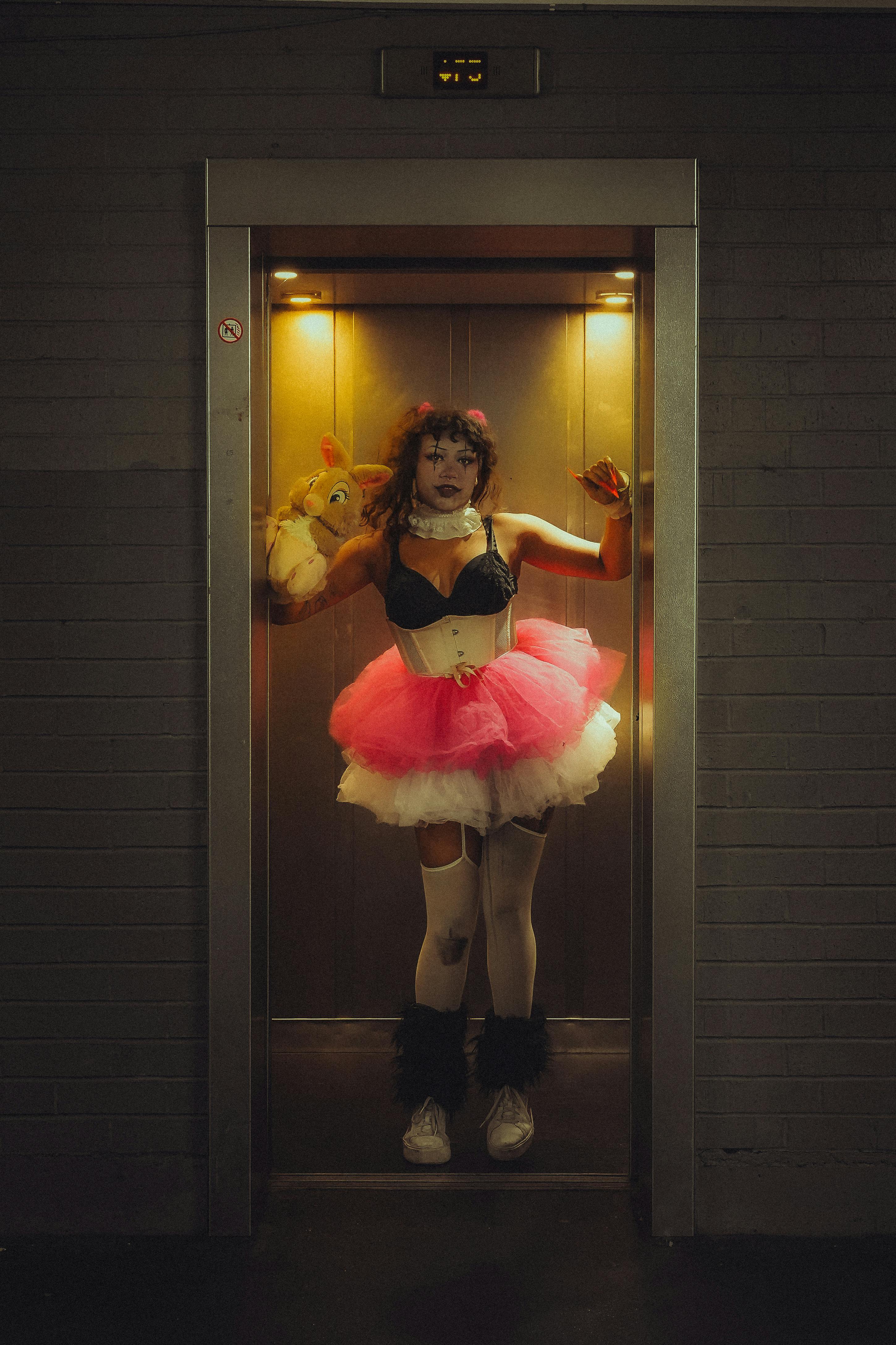 Creepy Clown in Elevator with Halloween Makeup · Free Stock Photo