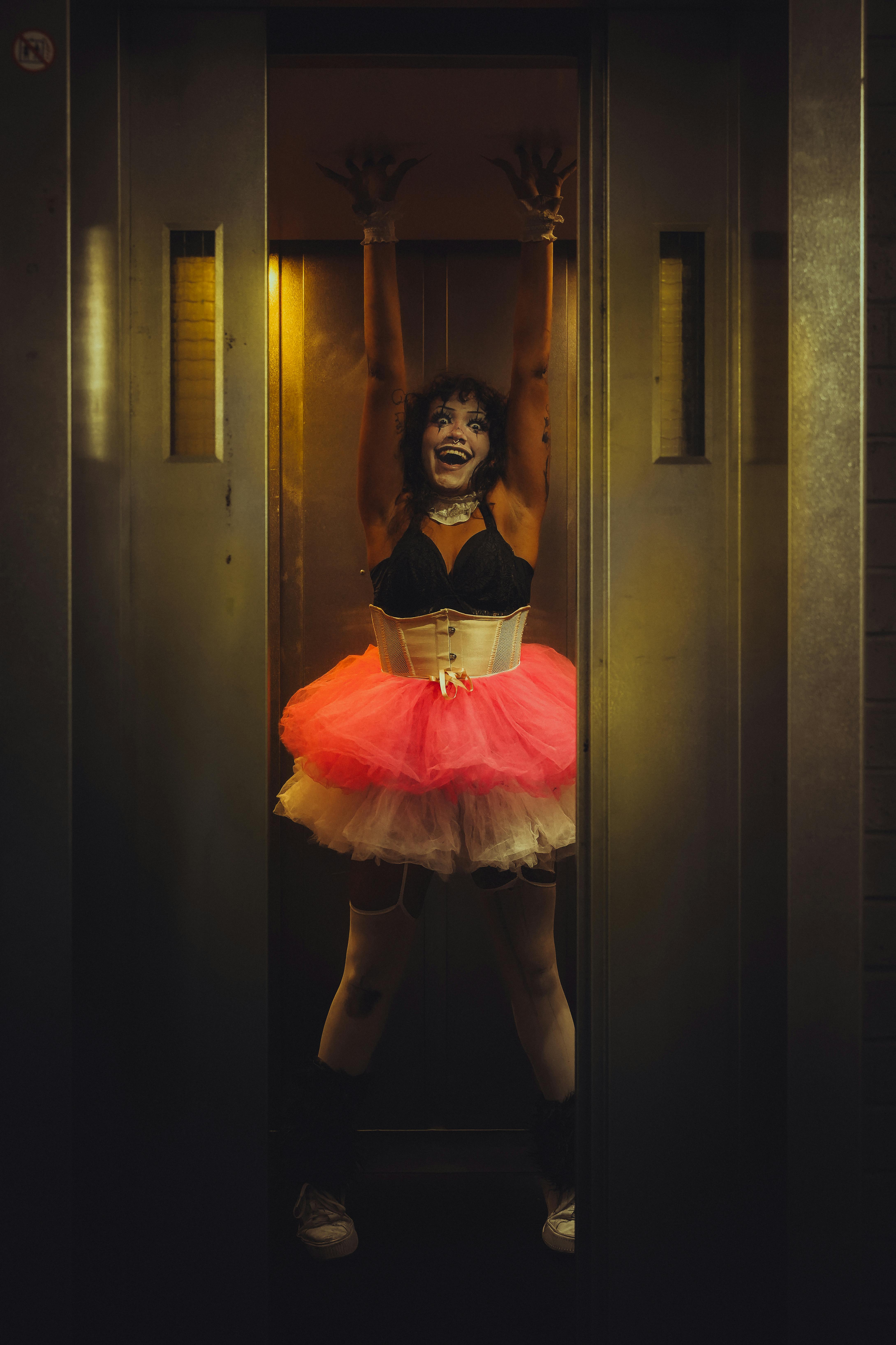 Gothic Clown in Elevator: Dark Halloween Cosplay · Free Stock Photo