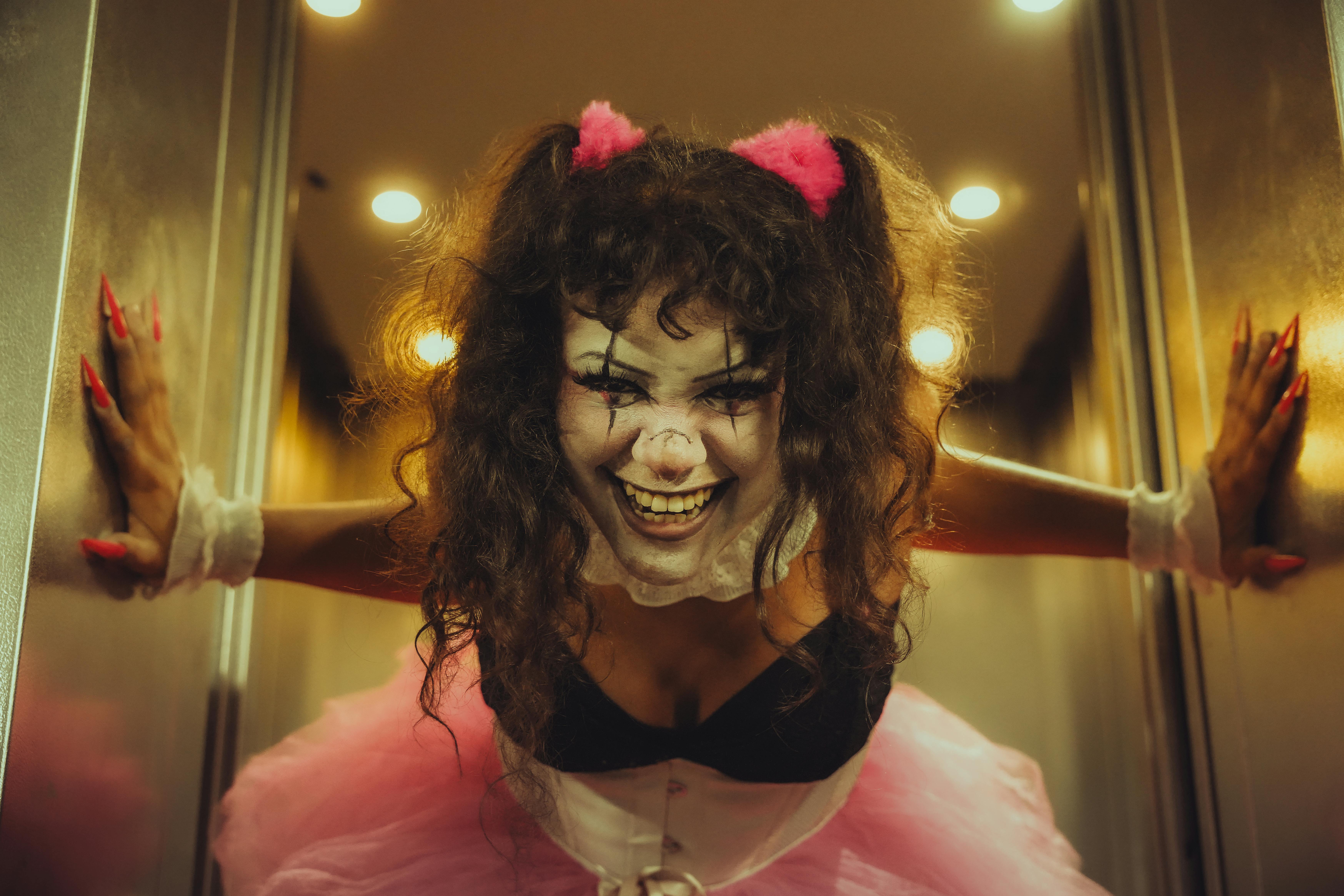 Spooky Clown in an Elevator with Pink Tutu · Free Stock Photo