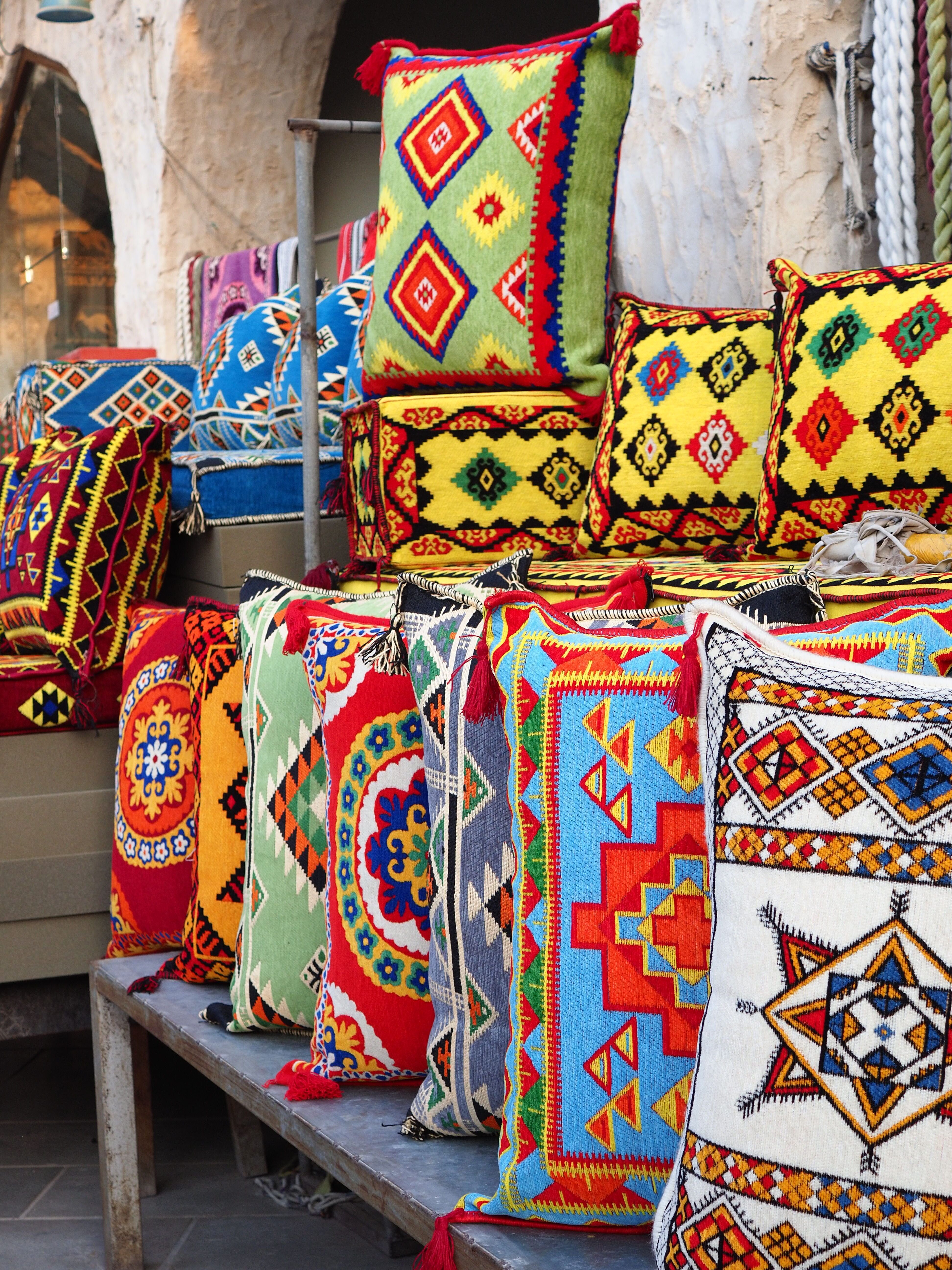 Vibrant Traditional Cushions on Display in Doha Market · Free Stock Photo