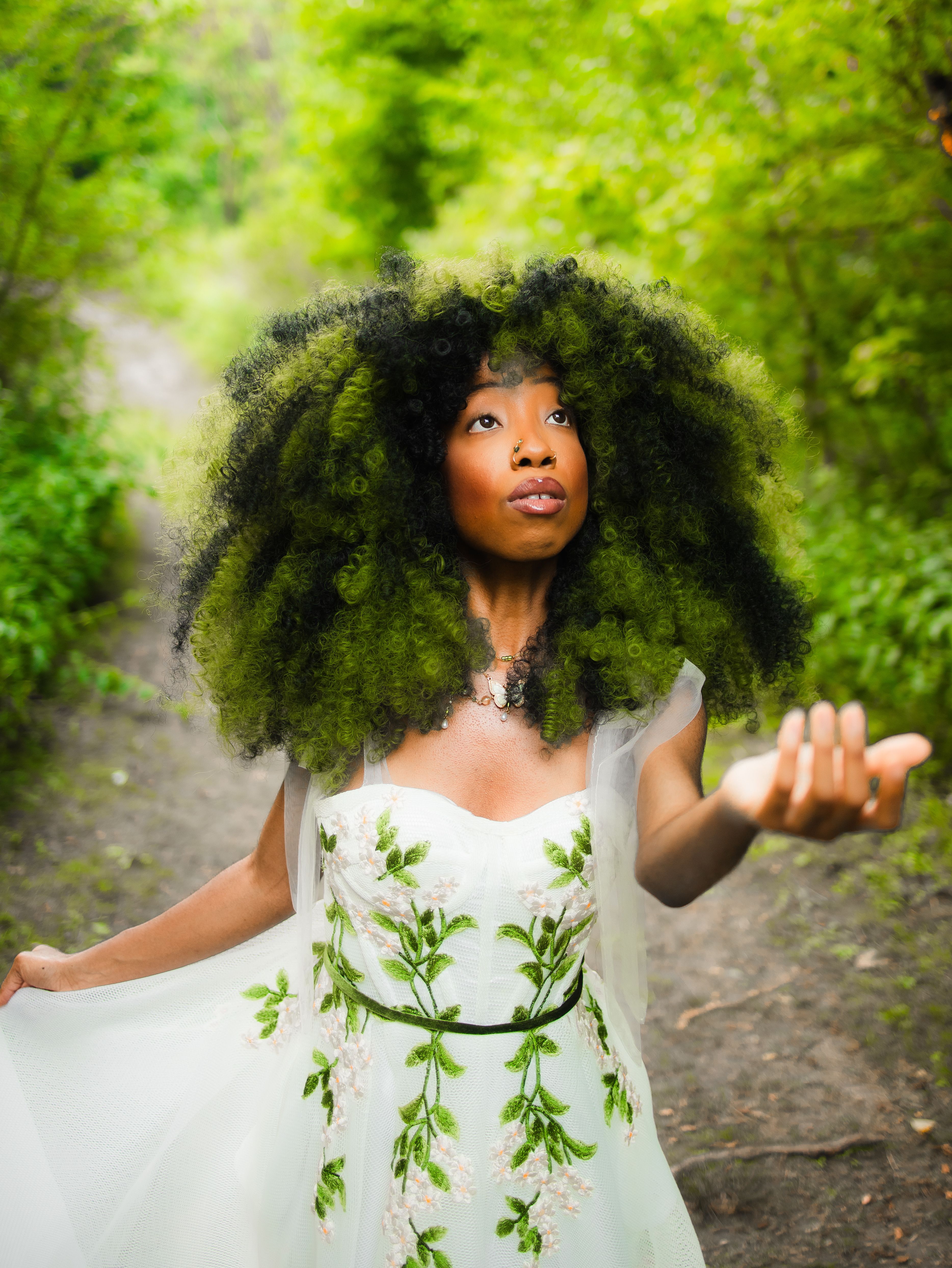 Elegant Woman in Nature with Greenery Dress · Free Stock Photo