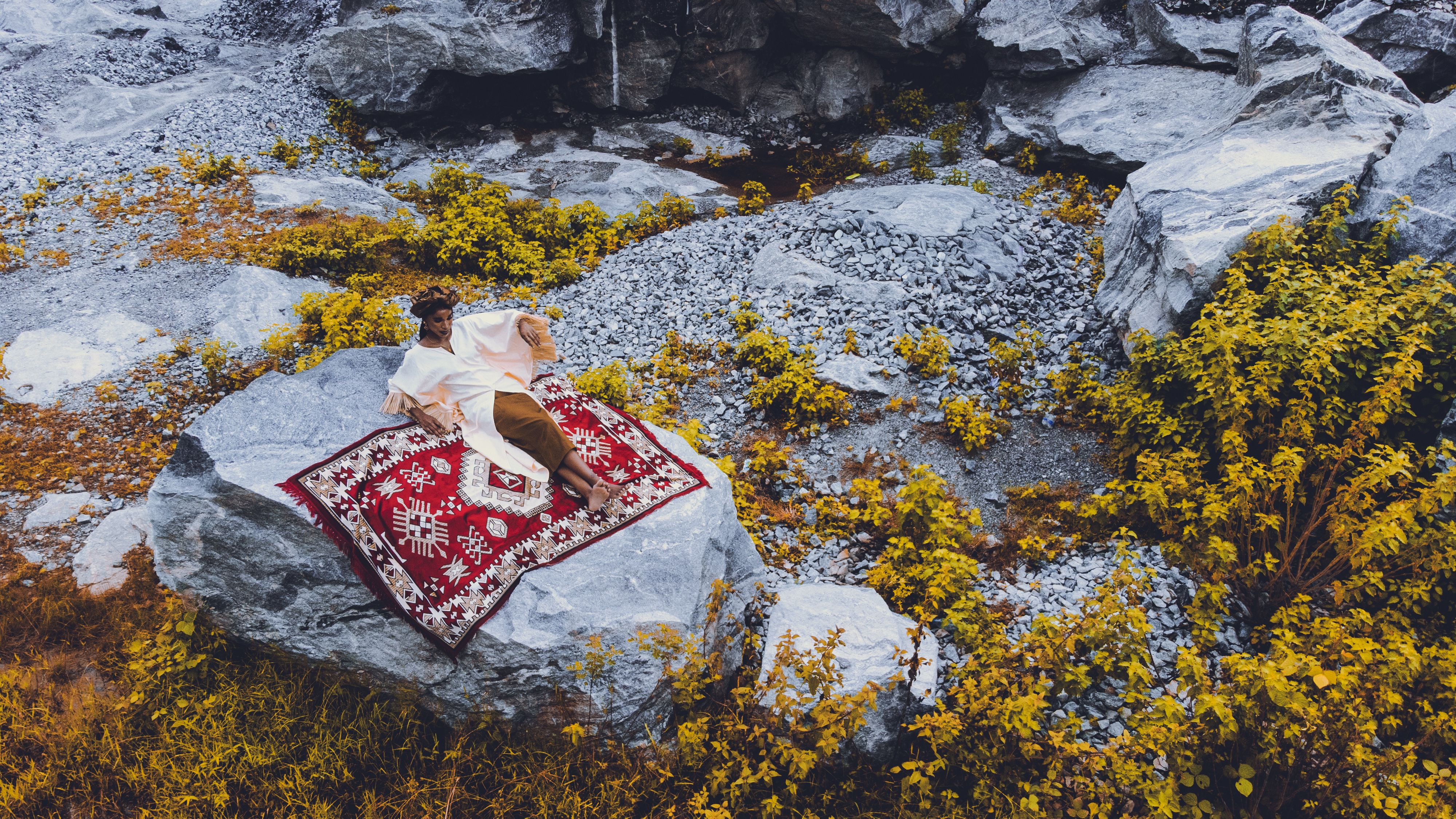 Relaxing on Rocks in Nigerian Landscape · Free Stock Photo