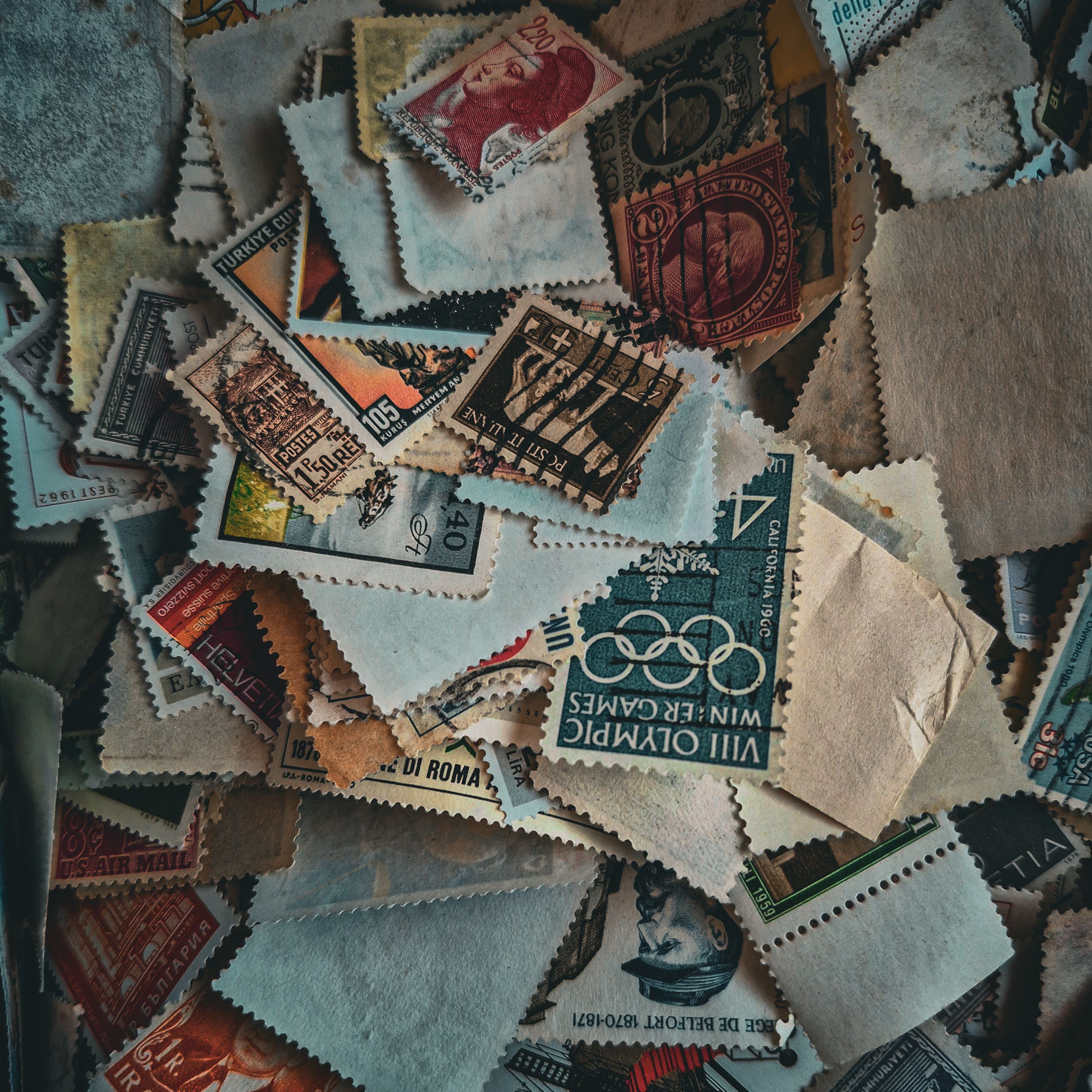 Vintage Postage Stamps Collection Close-up · Free Stock Photo