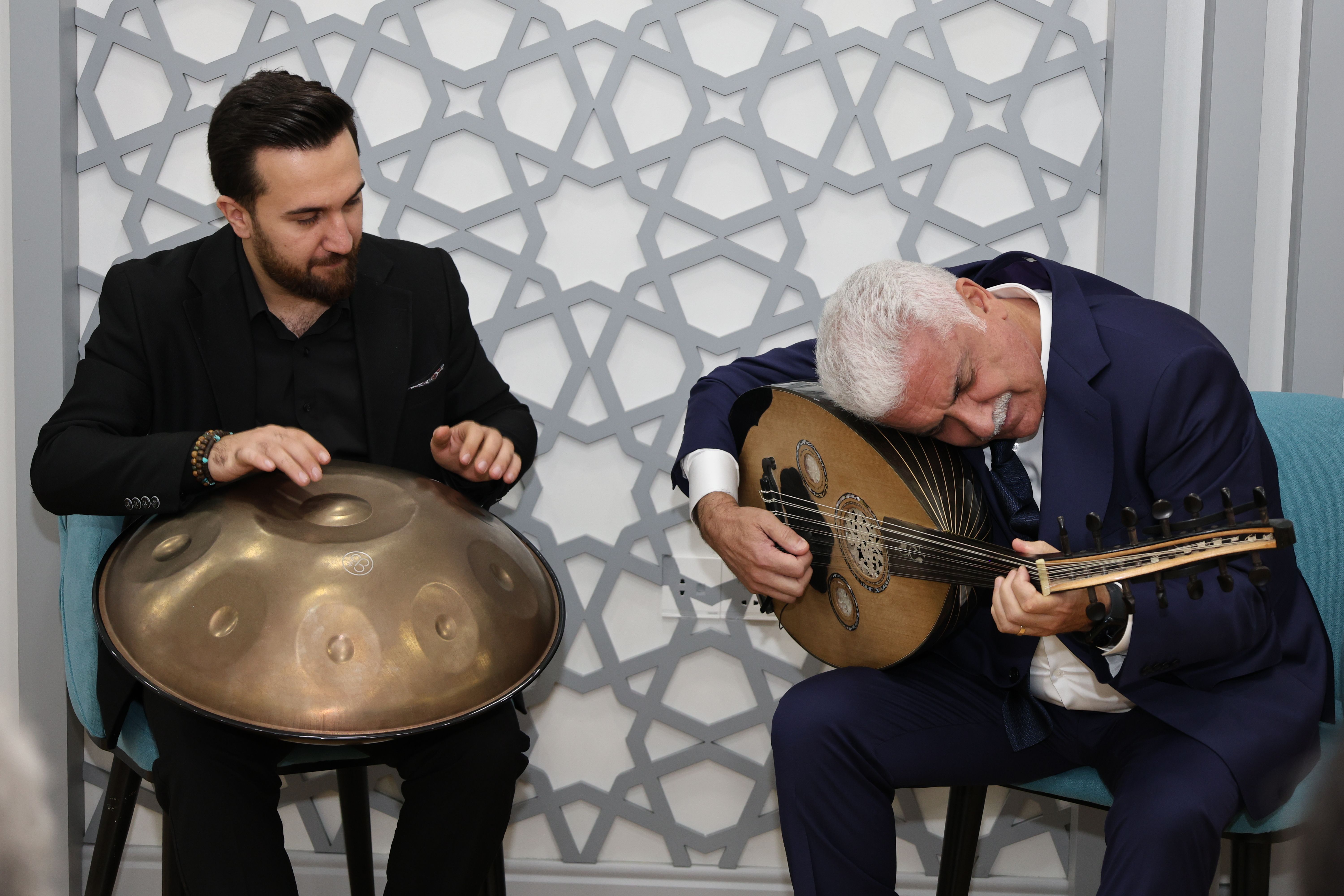 Traditional Music Performance with Oud and Handpan · Free Stock Photo
