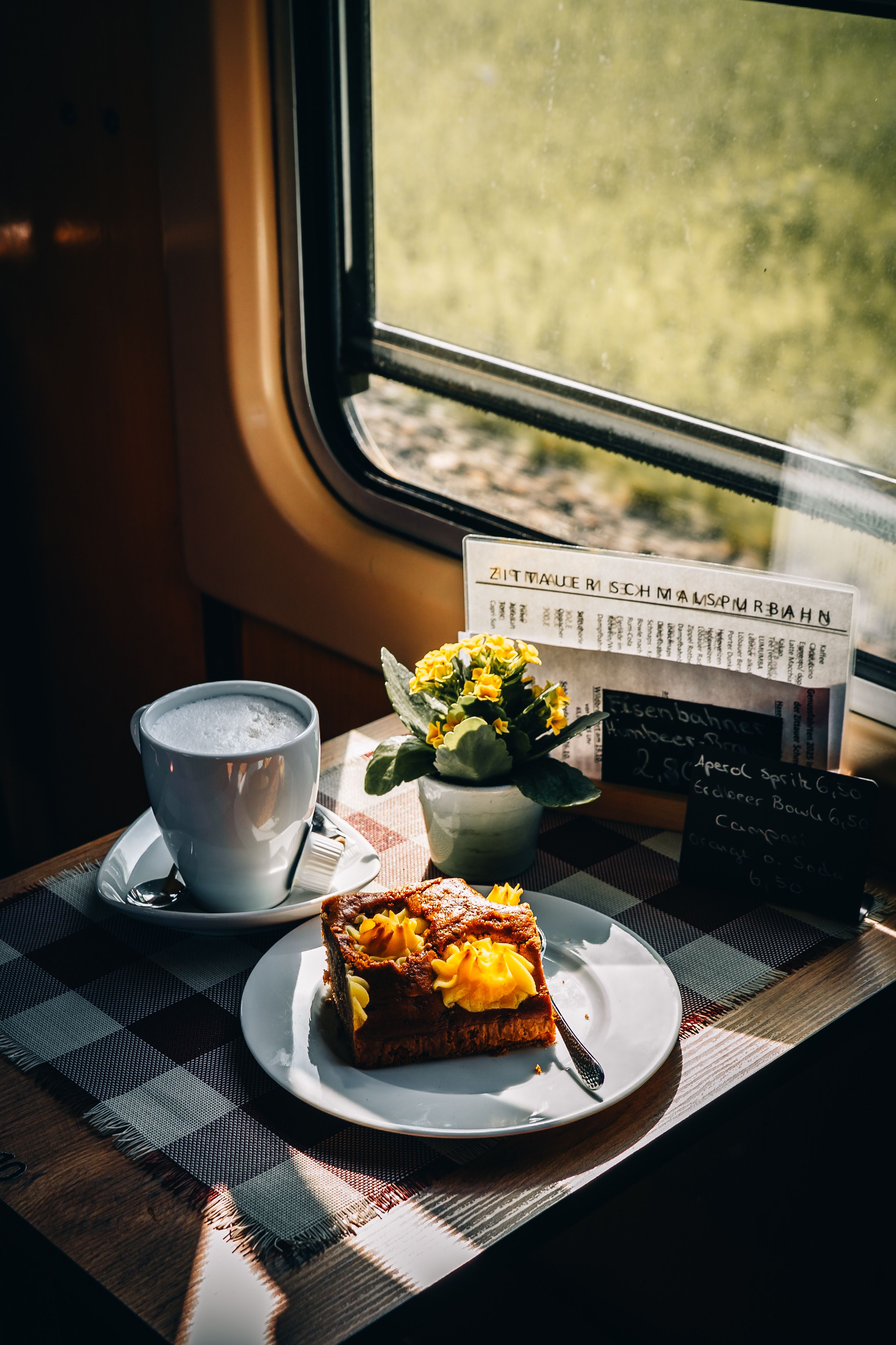 Cozy Train Breakfast with Coffee and Cake · Free Stock Photo