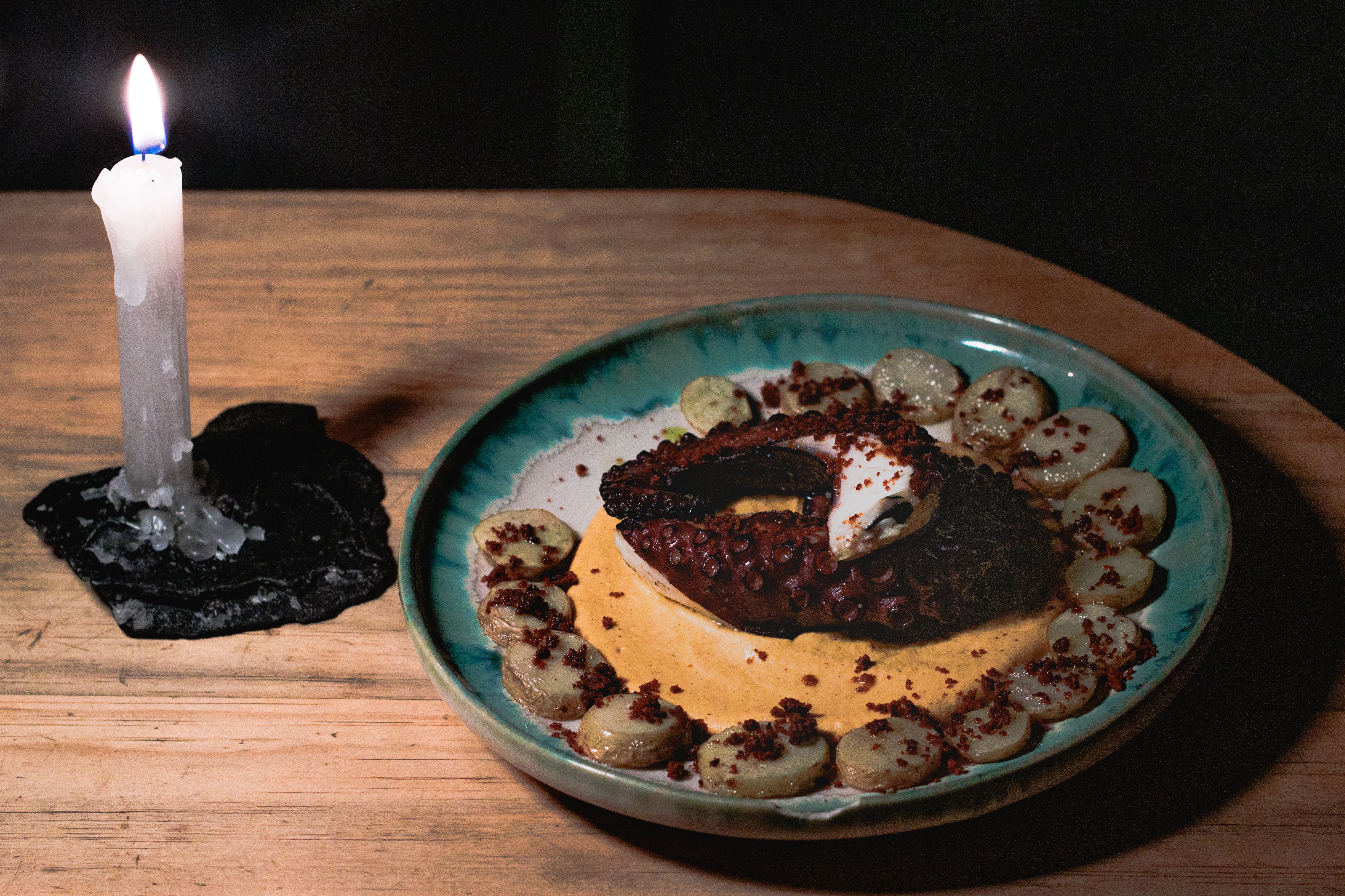 Octopus Dish with Potatoes and Candlelight · Free Stock Photo