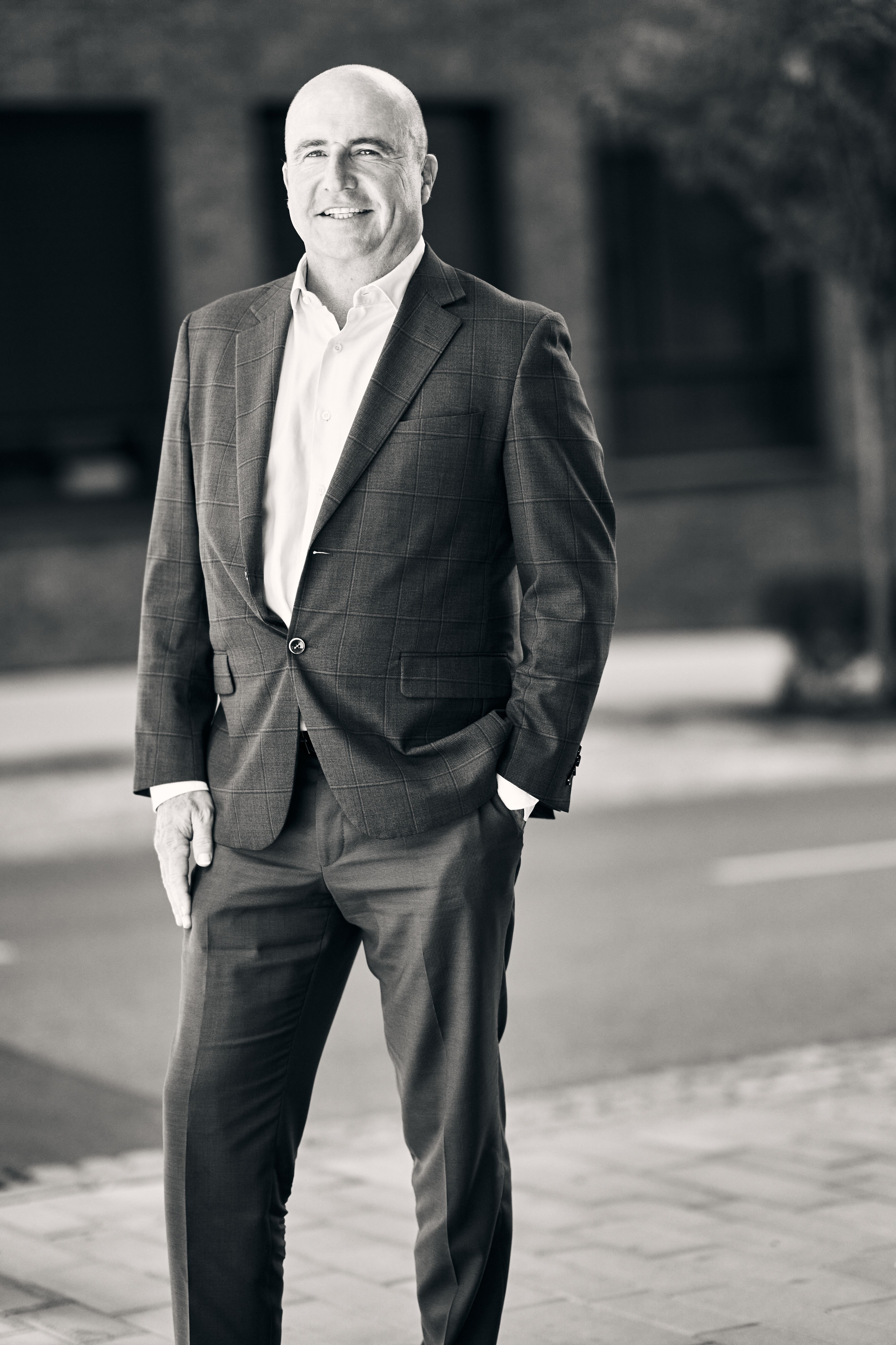 Full Length Portrait of Man Standing in Corridor · Free Stock Photo