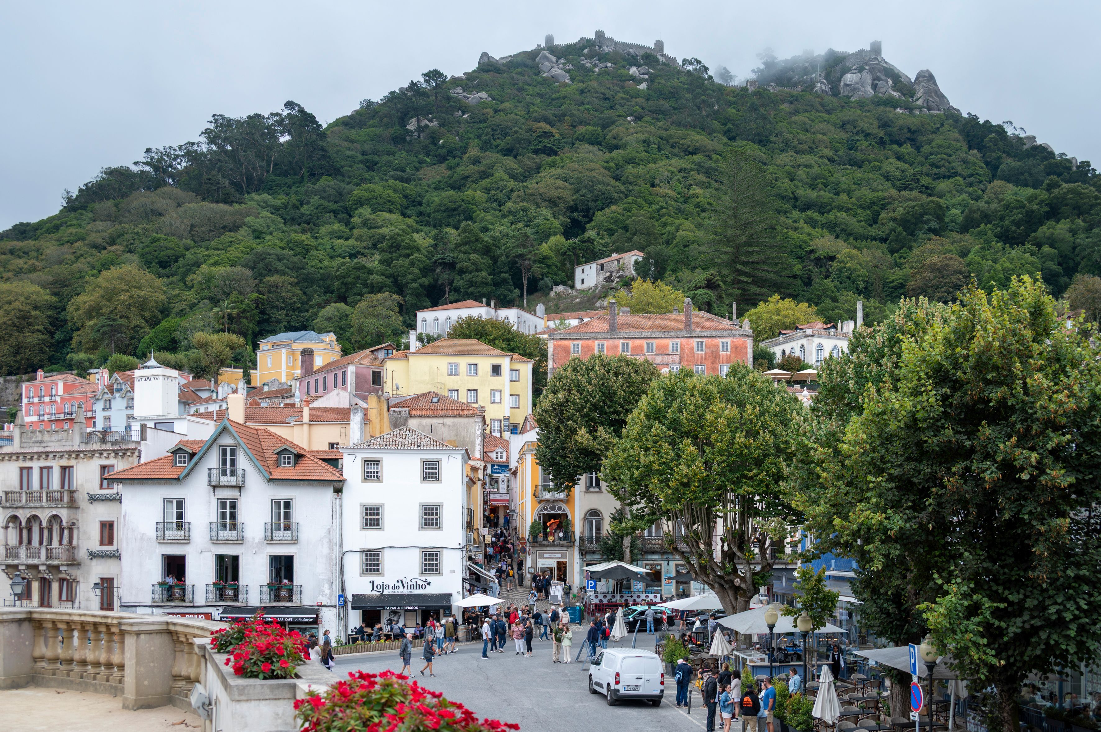 Bustling Sintra Street with Moorish Castle View · Free Stock Photo