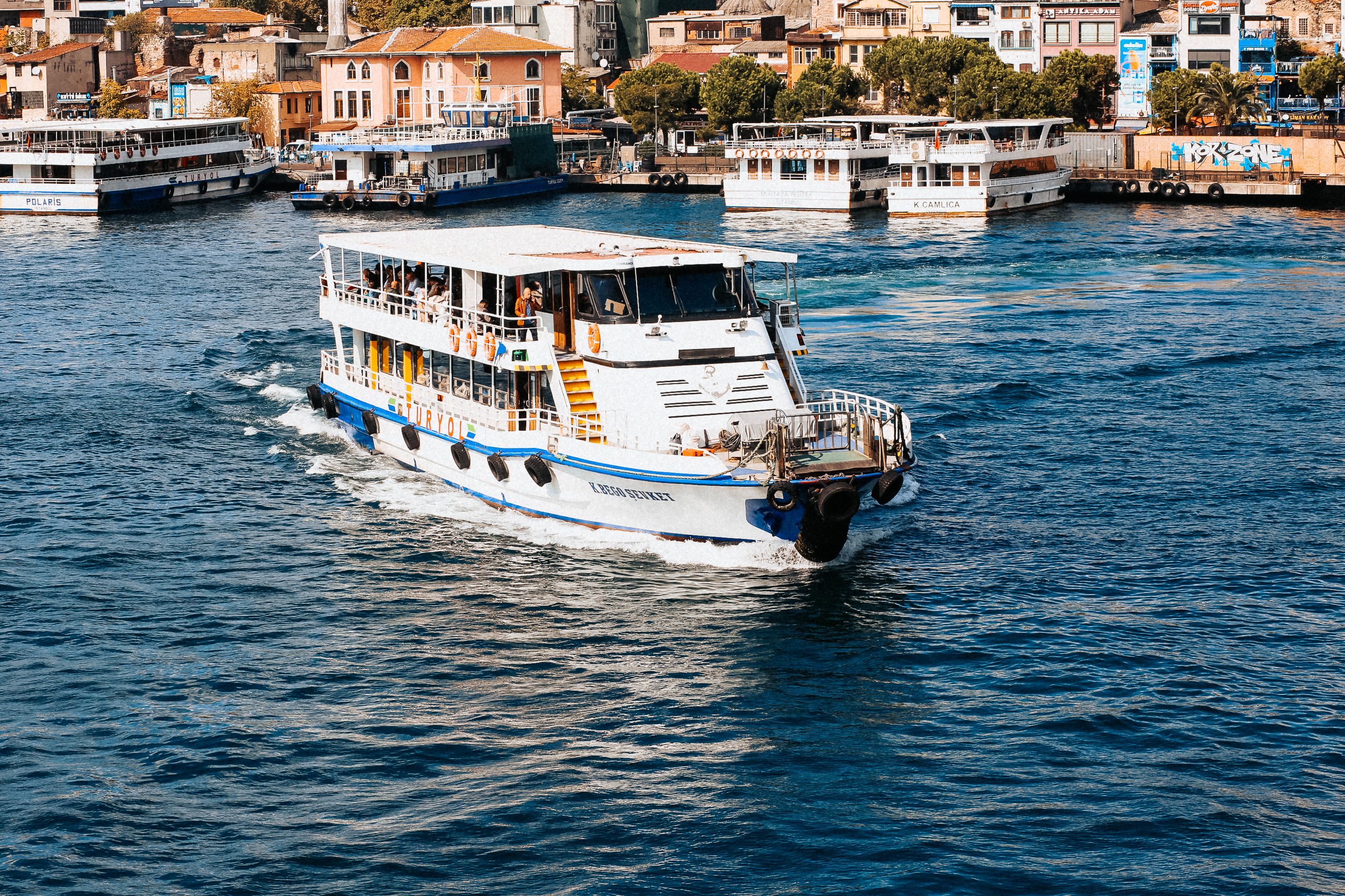 Charming Cruise Ship in Bustling Harbor Scene · Free Stock Photo