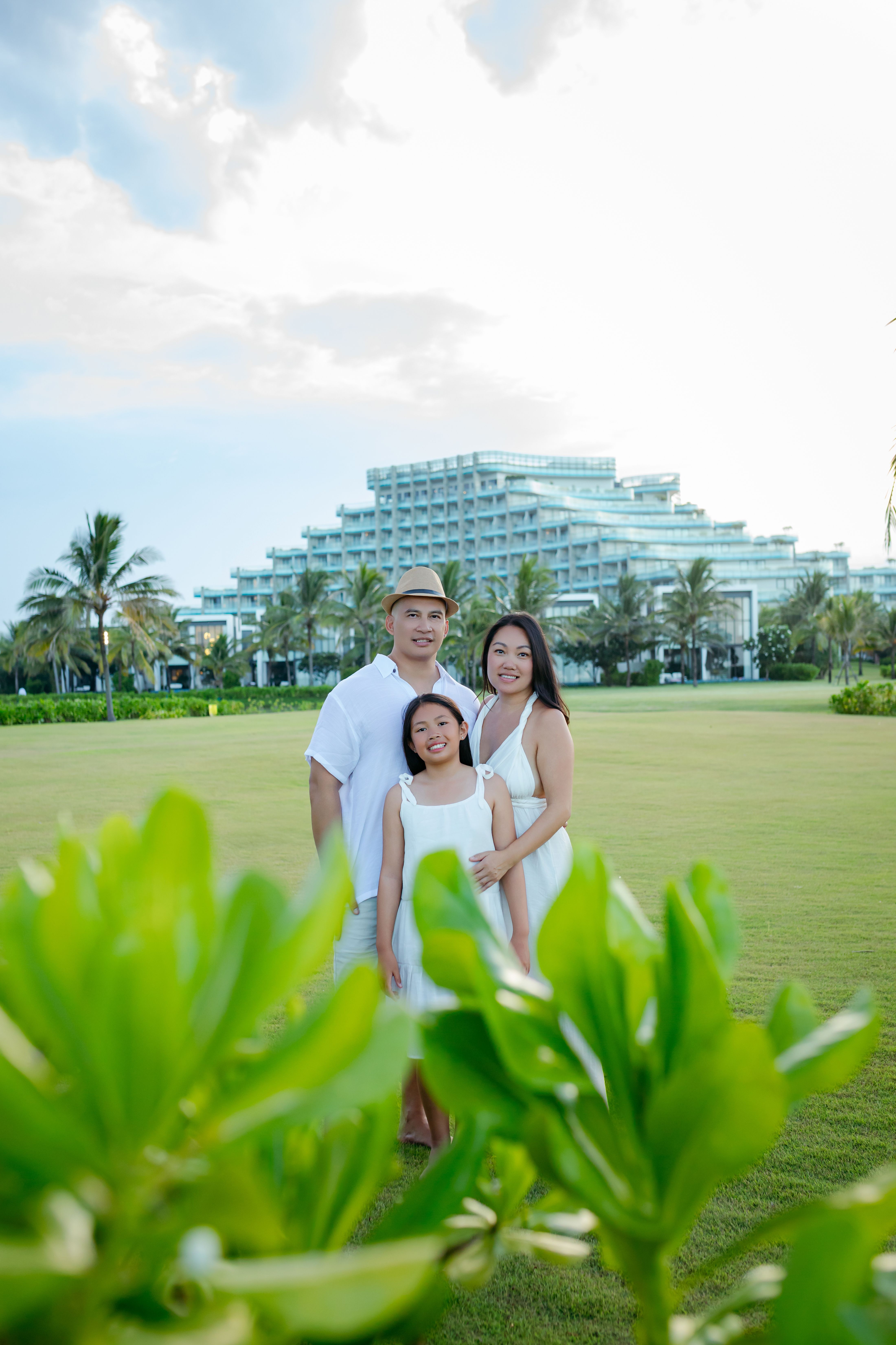 Family Portrait in Hội An Resort Setting · Free Stock Photo