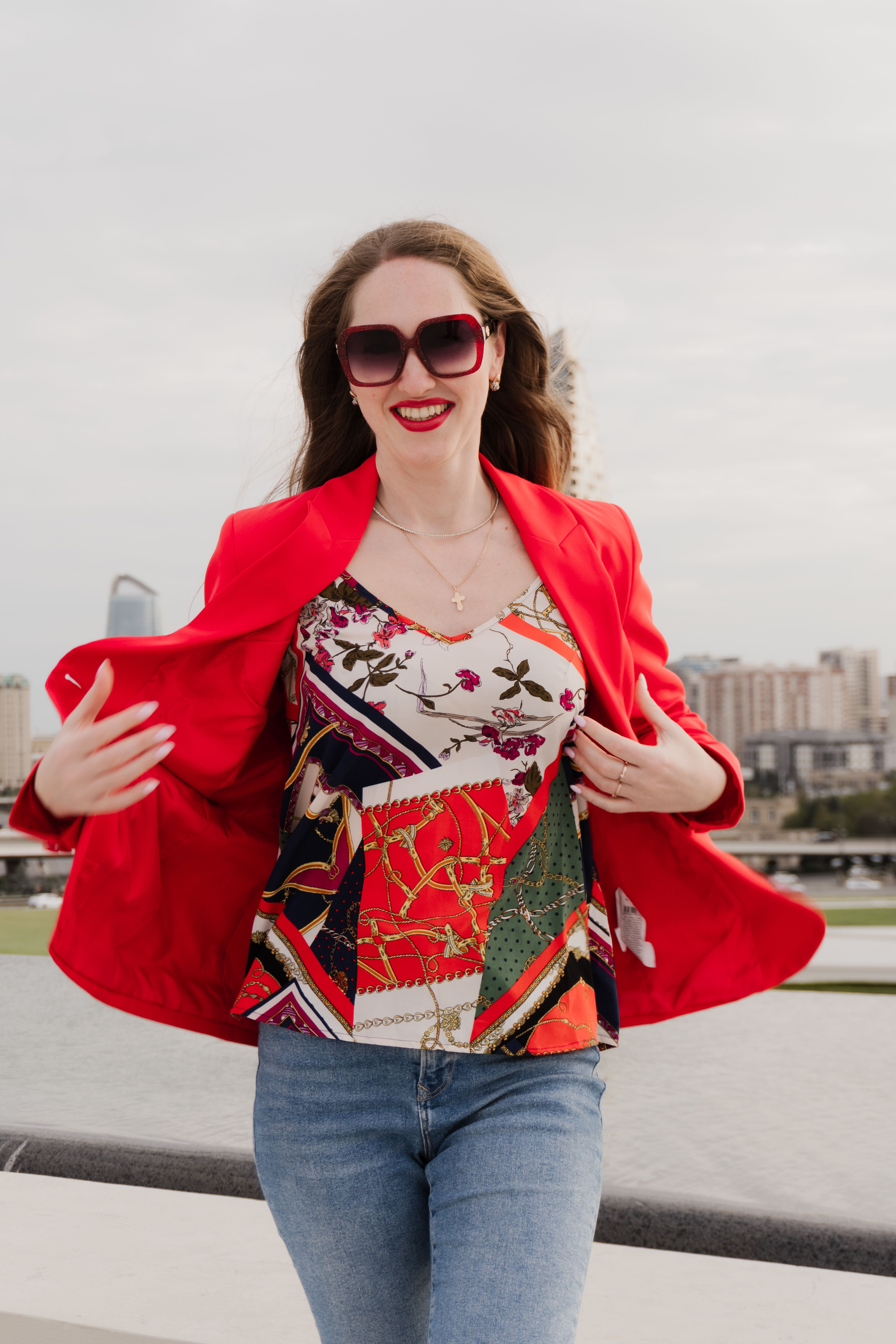 Stylish Woman in Red Jacket in Urban Setting · Free Stock Photo