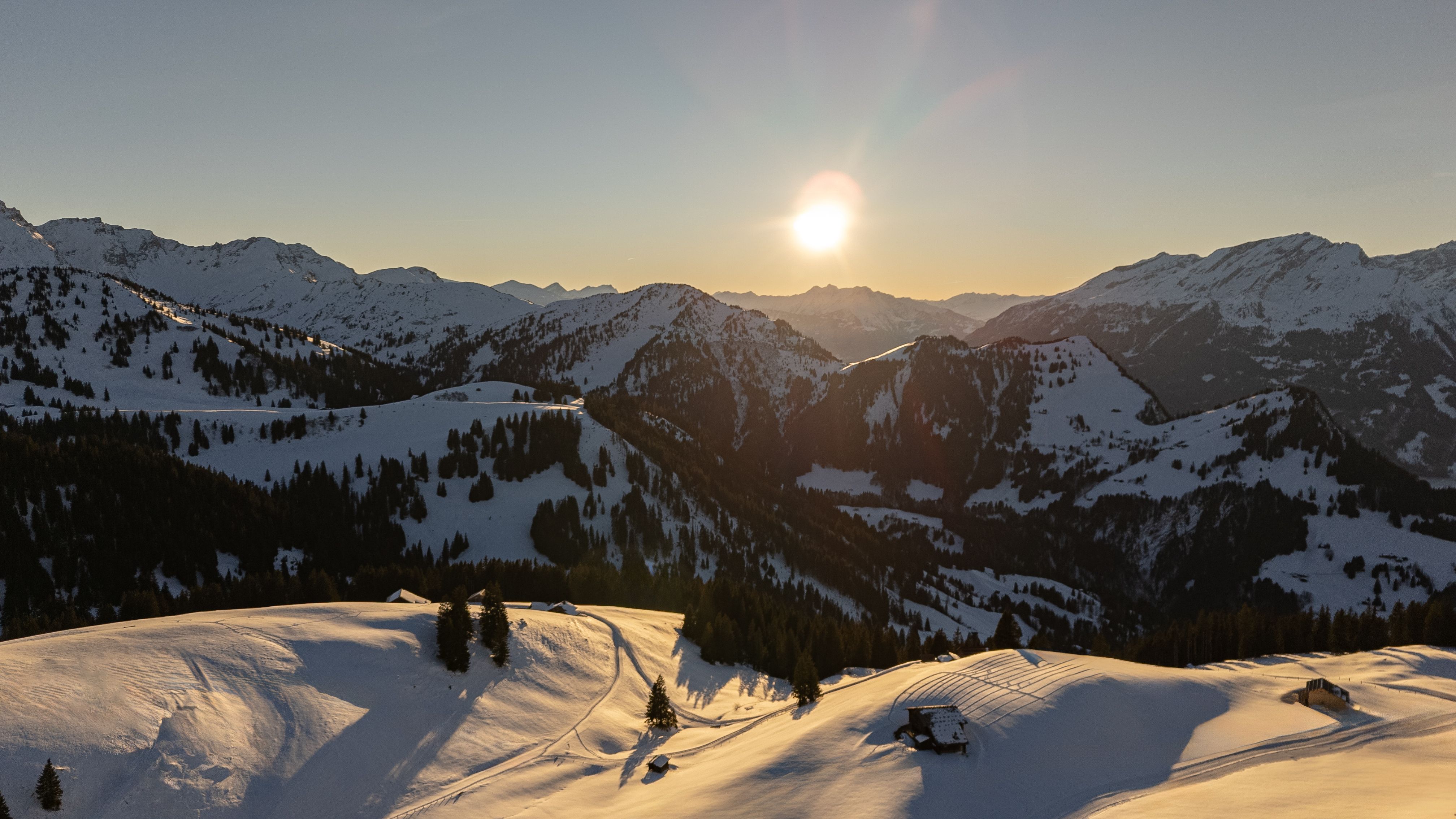 Breathtaking Winter Sunset in Swiss Alps · Free Stock Photo