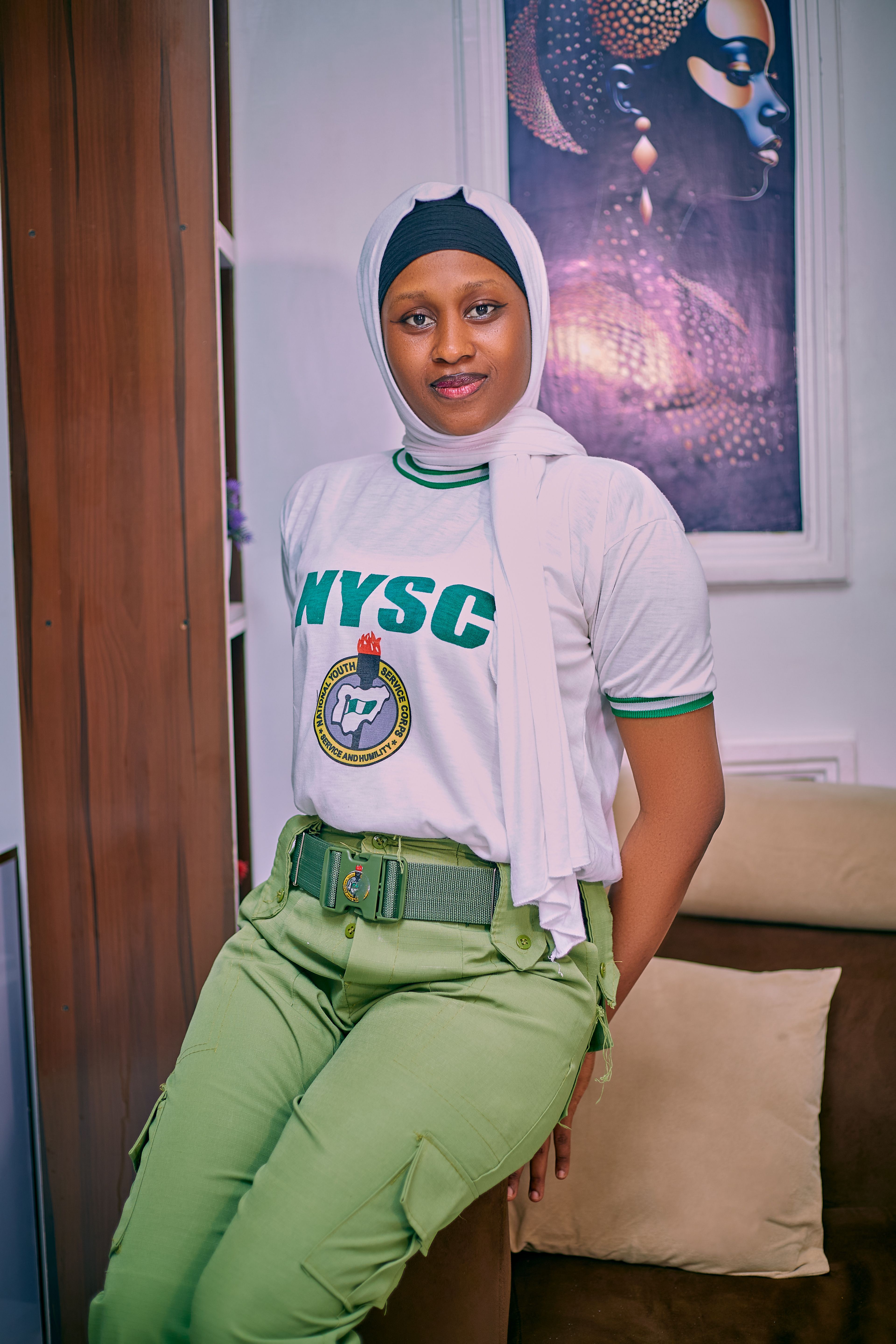 Female NYSC Member with Traditional Attire Indoors · Free Stock Photo