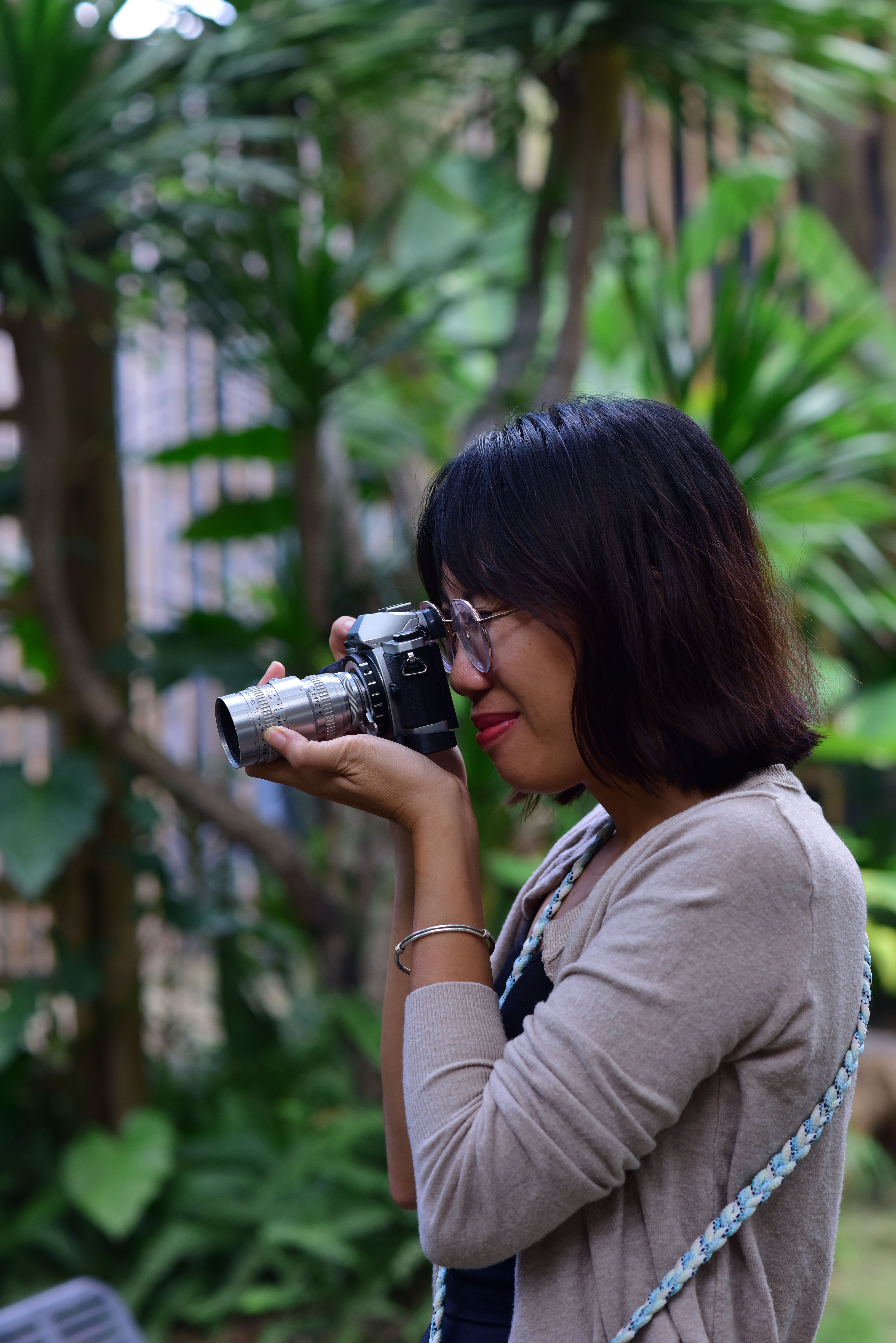 Person Photographing with Camera Outdoors · Free Stock Photo