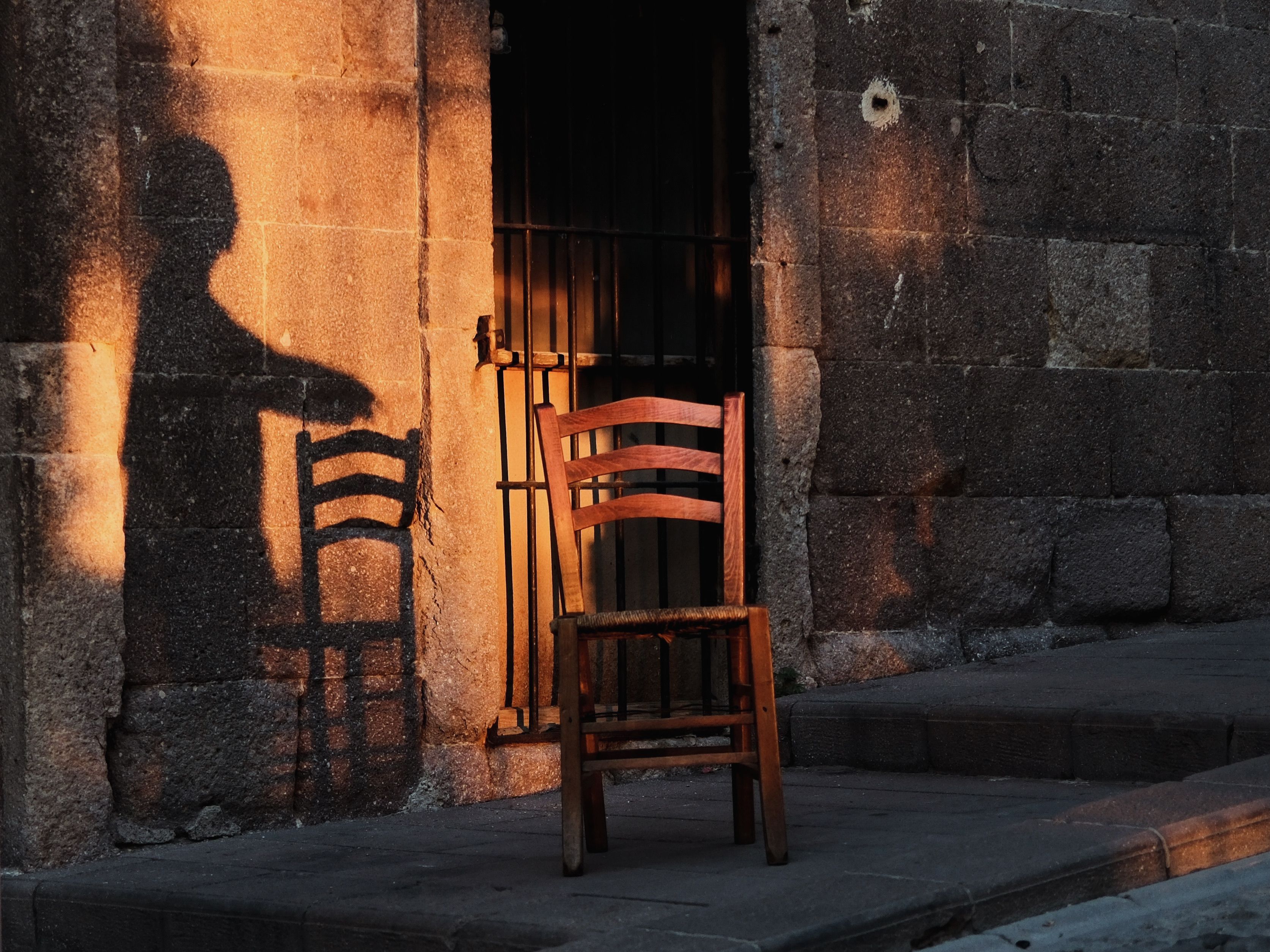 Dramatic Shadow and Chair in Sunset Light · Free Stock Photo