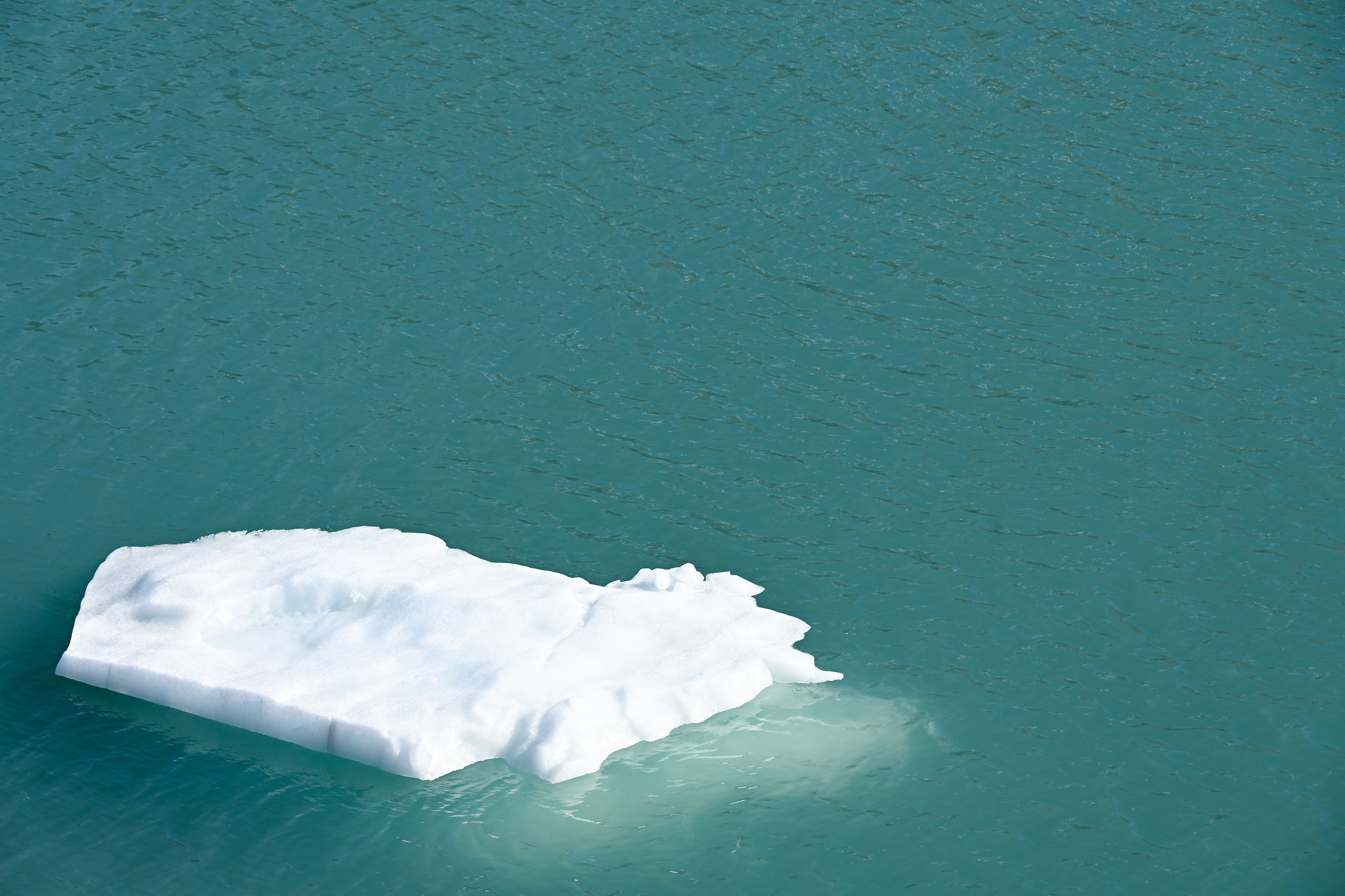 Floating Iceberg in Turquoise Alaskan Waters · Free Stock Photo