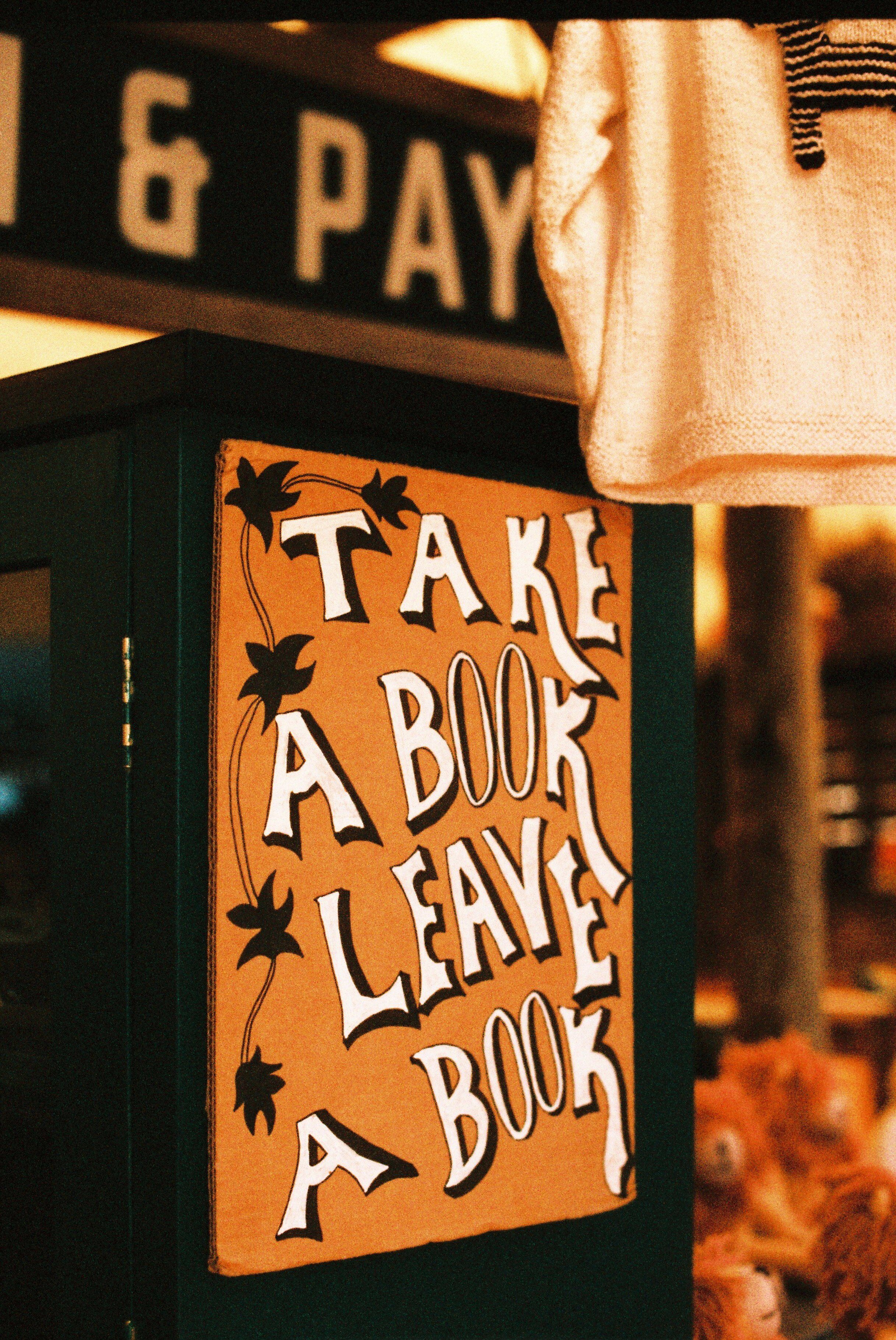 Vintage Style Book Exchange Sign in Bookstore · Free Stock Photo