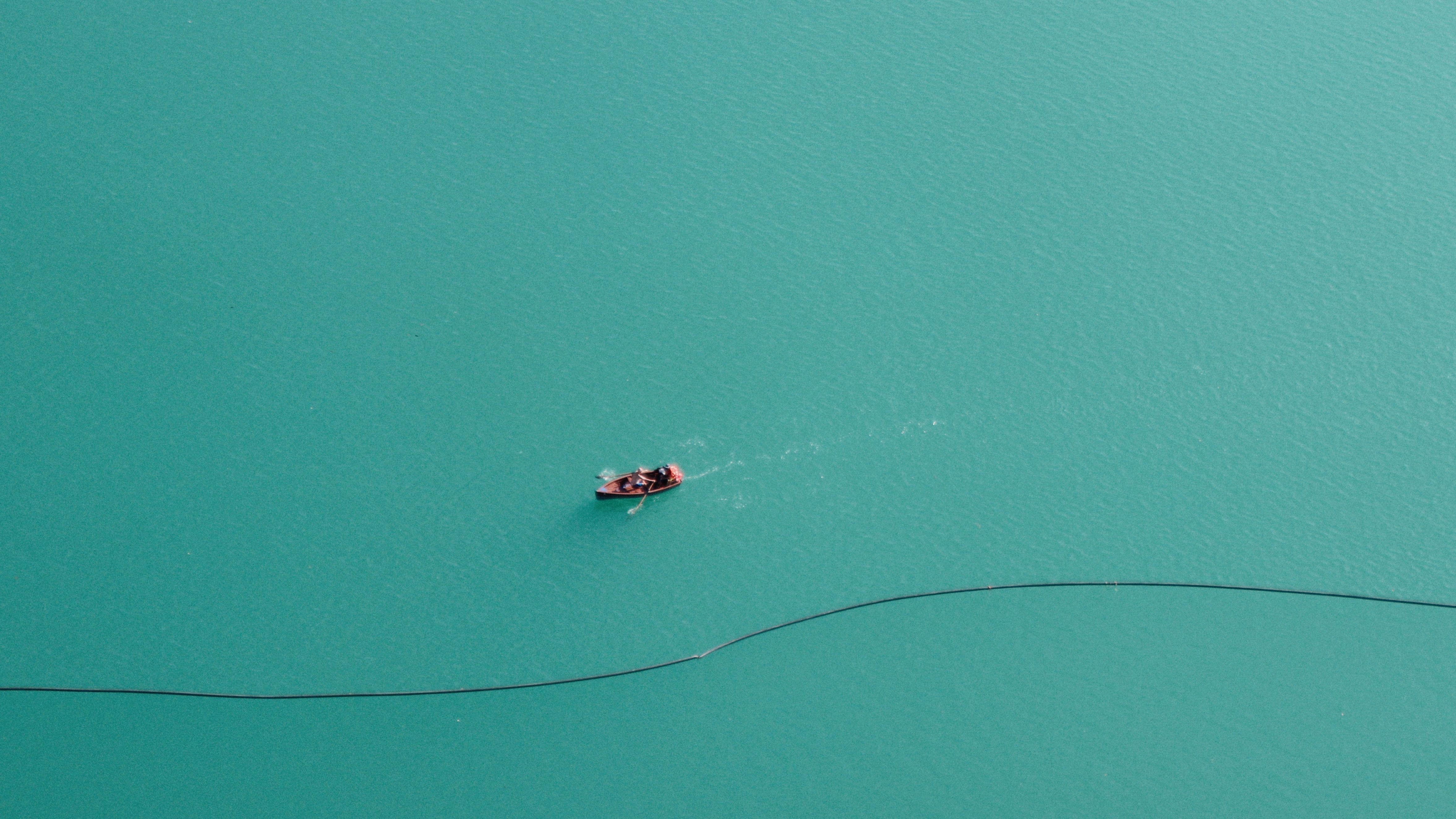 Aerial View of Canoe on Turquoise Water · Free Stock Photo
