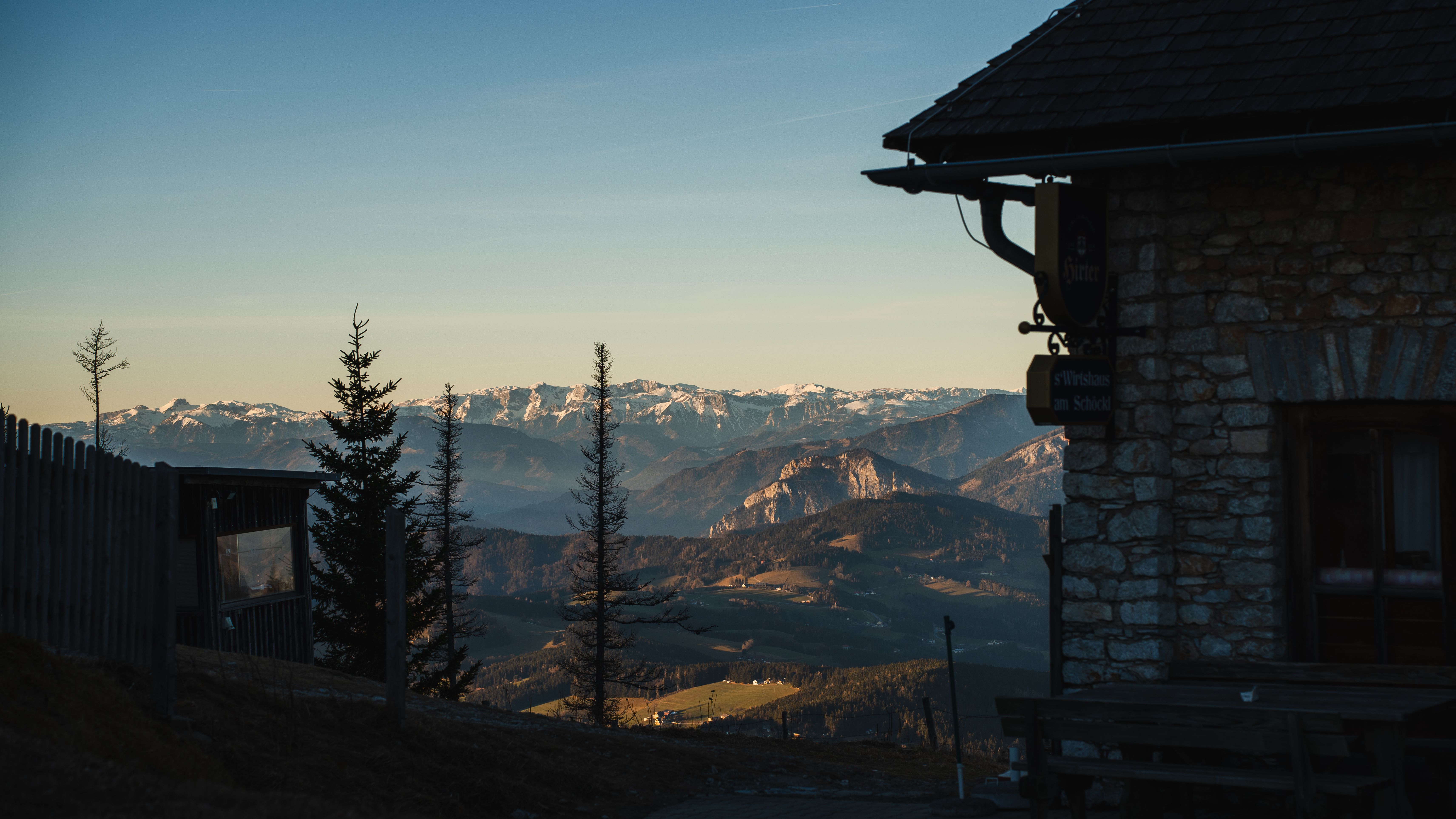 Scenic Mountain View from a Rustic Cabin · Free Stock Photo