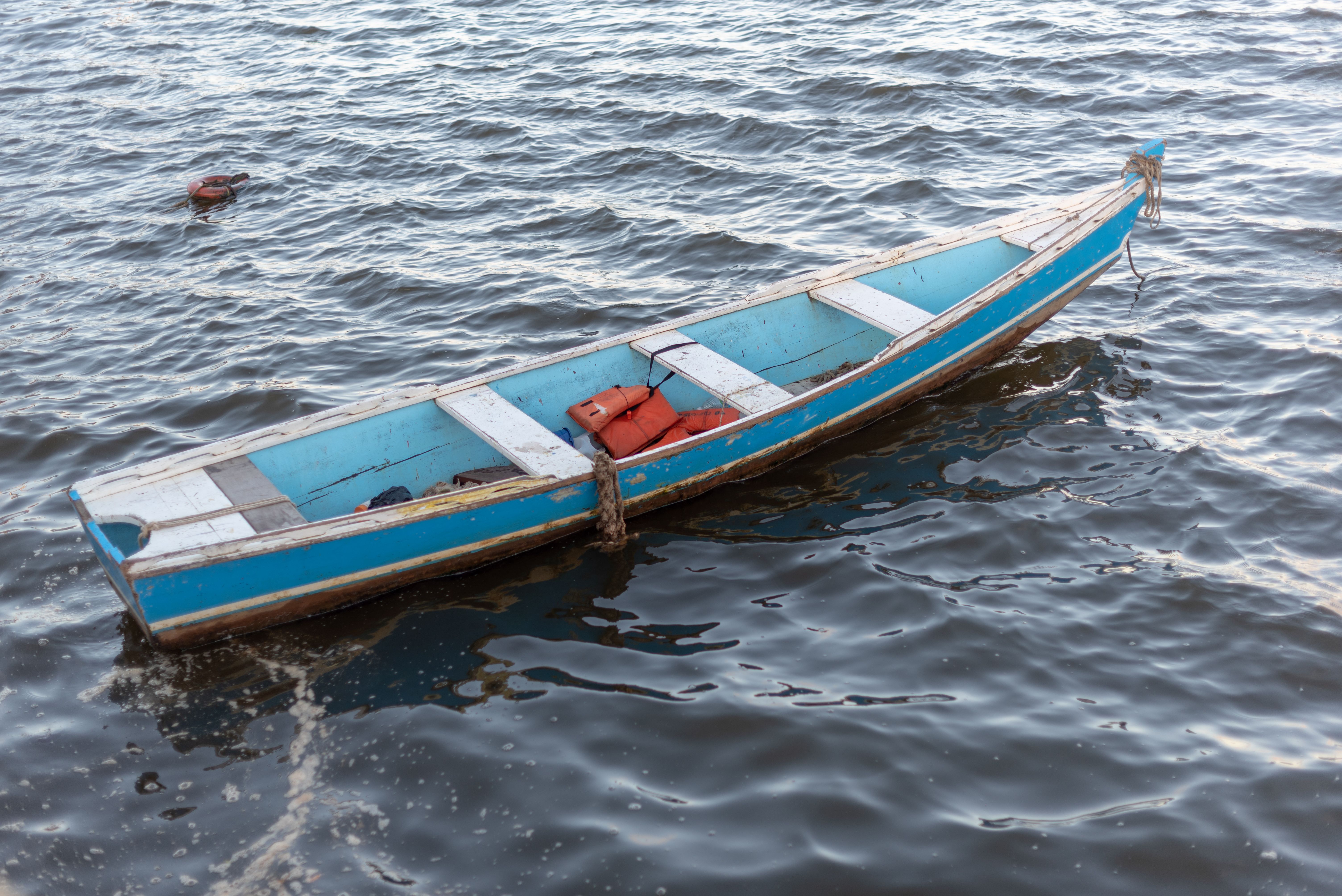 Blue Boat Floating in Calm Waters of Arraial d'Ajuda · Free Stock Photo