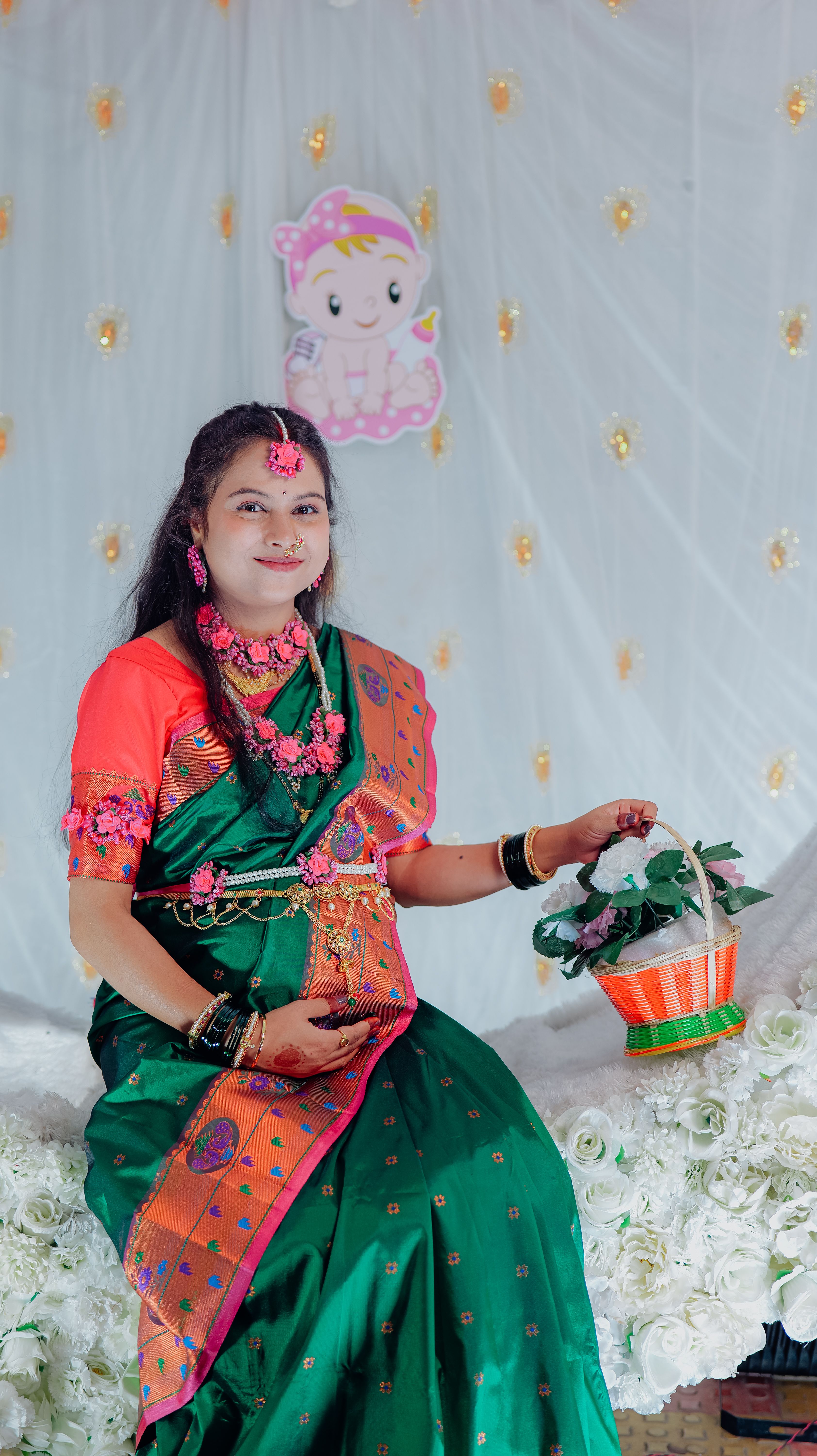 Elegant Maternity Ceremony in Traditional Attire · Free Stock Photo