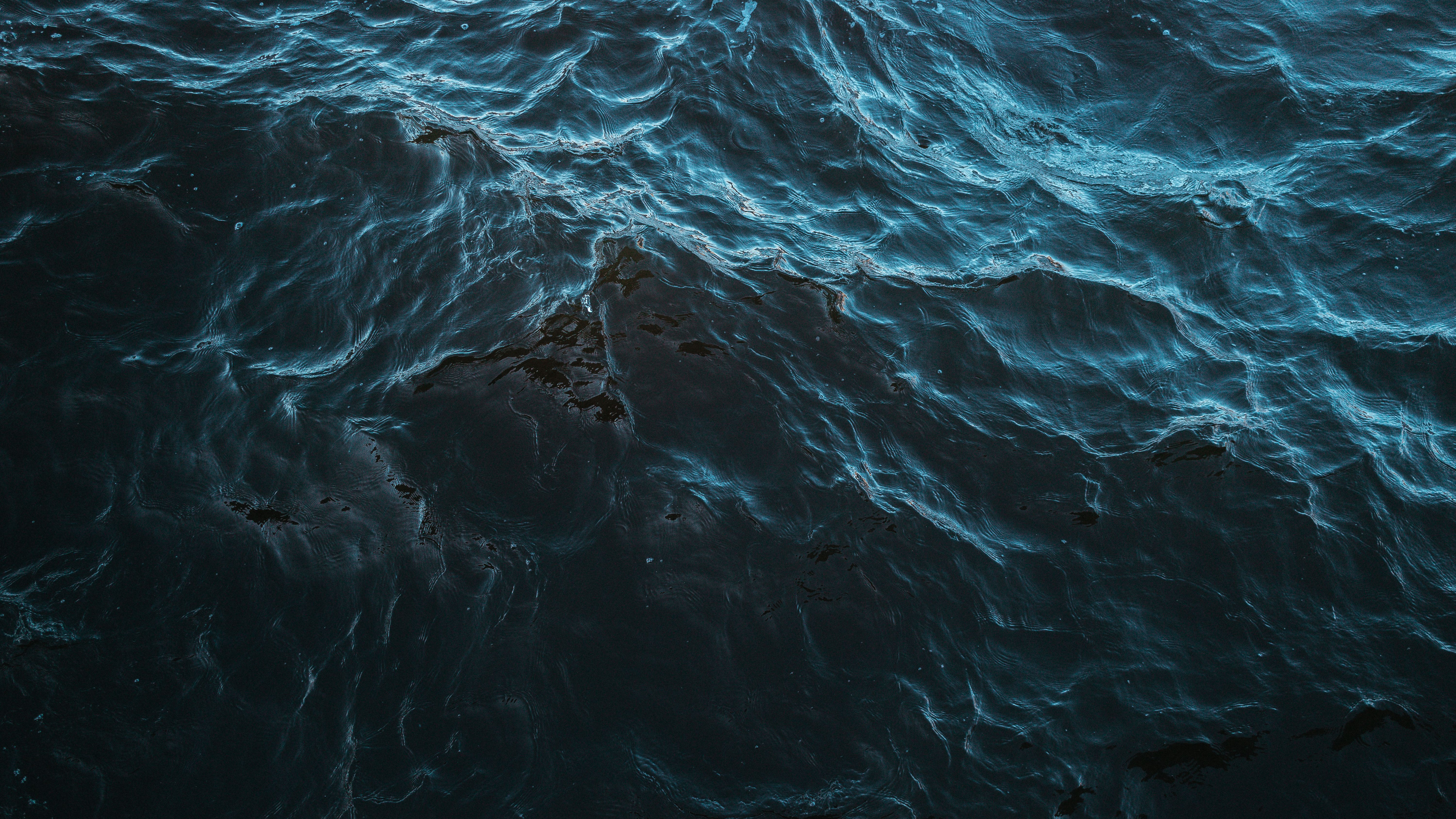 Serene Dark Blue Ocean Waves Captured Close-Up · Free Stock Photo