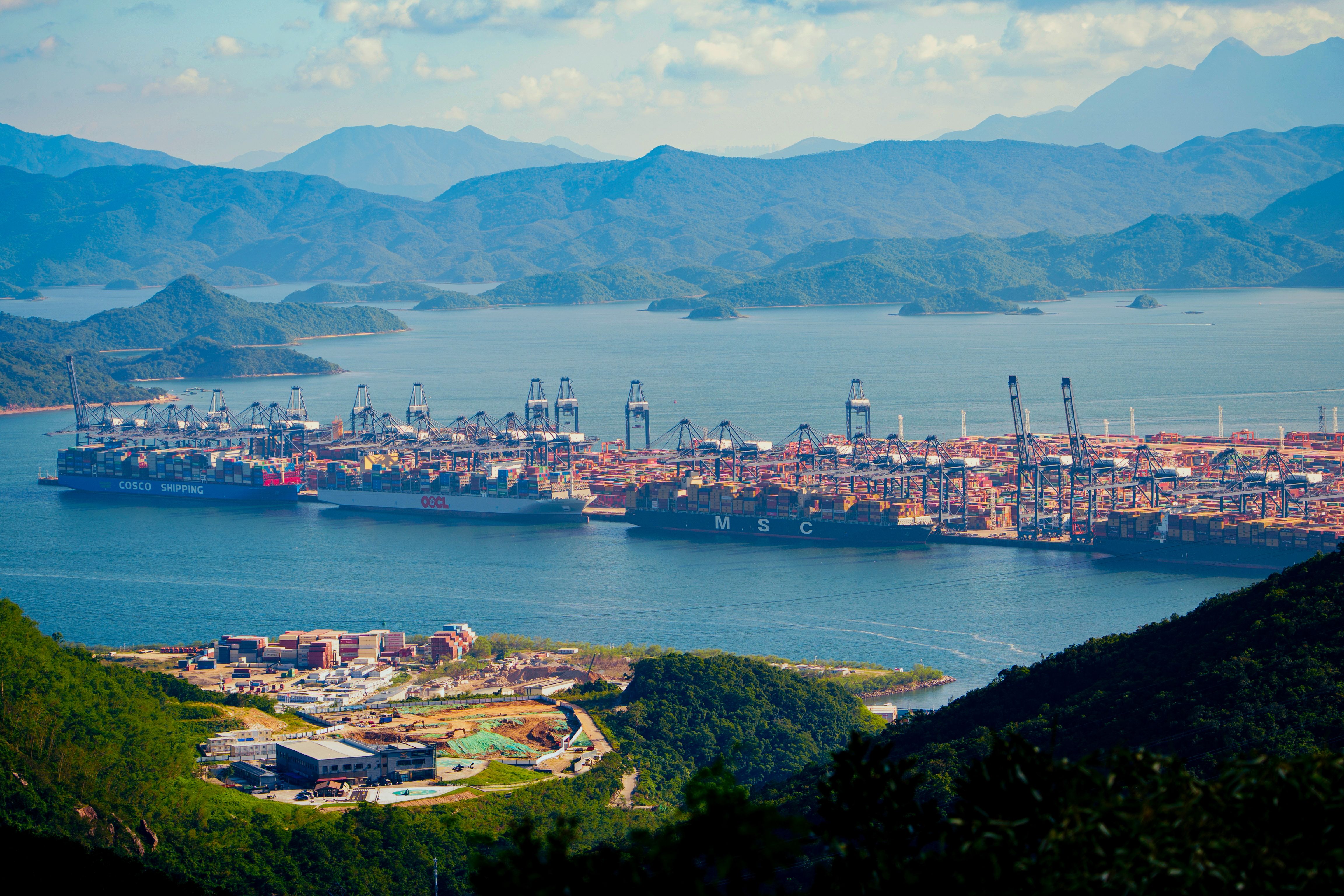 Aerial View of Shipping Port in Mountainous Region · Free Stock Photo
