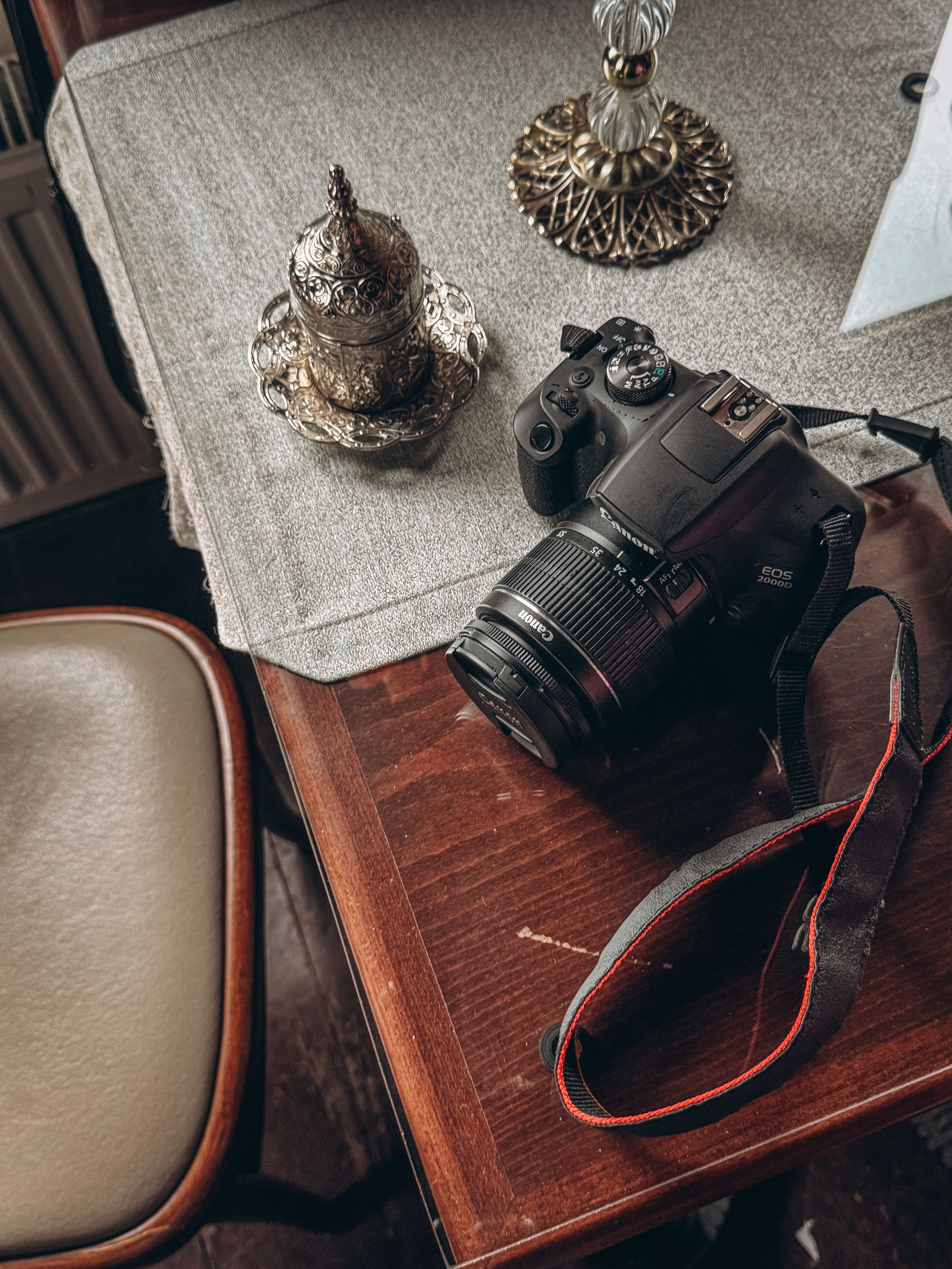 Vintage Coffee Table with Camera and Cup of Tea · Free Stock Photo