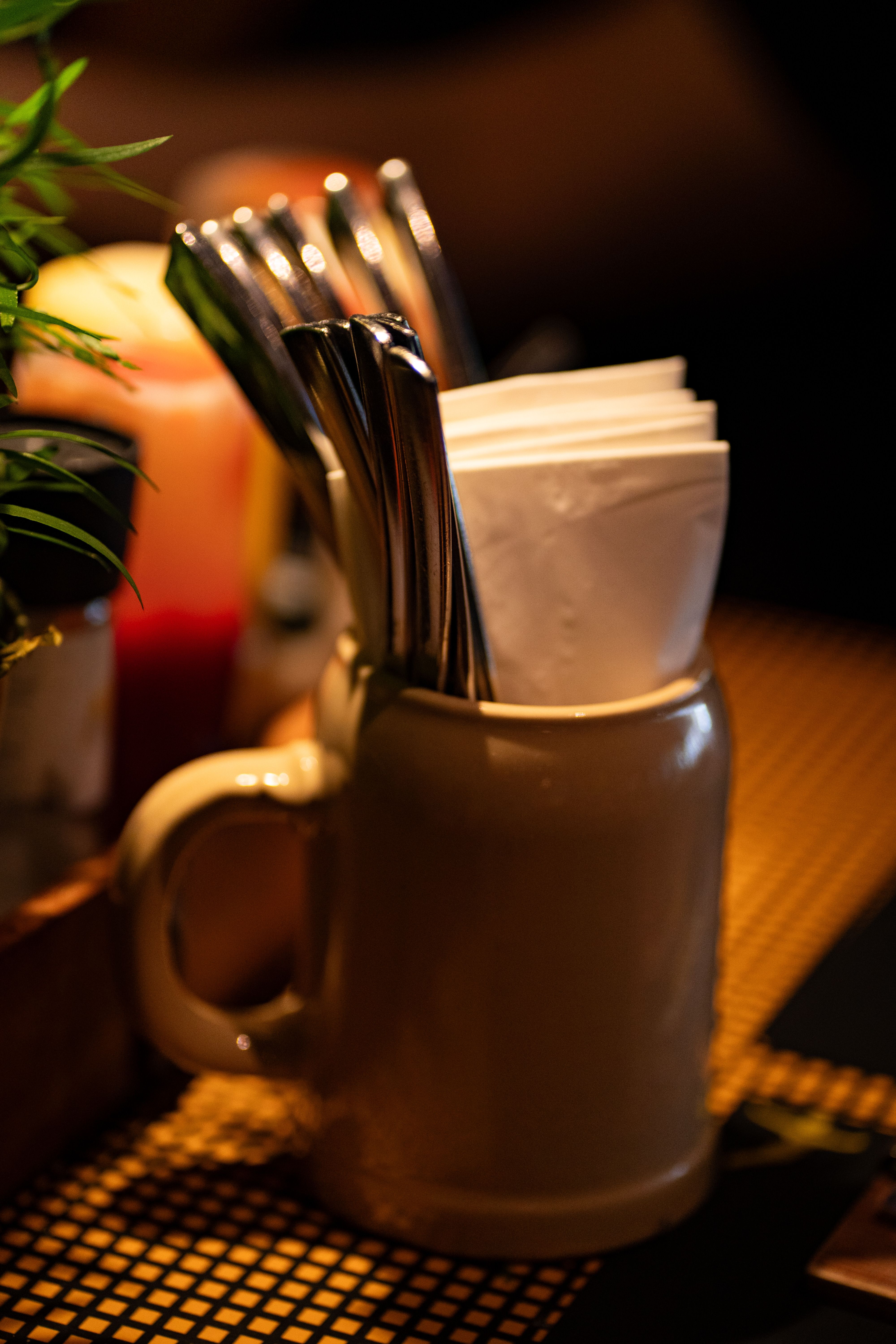 Cozy Table Setting with Cutlery in Mug · Free Stock Photo