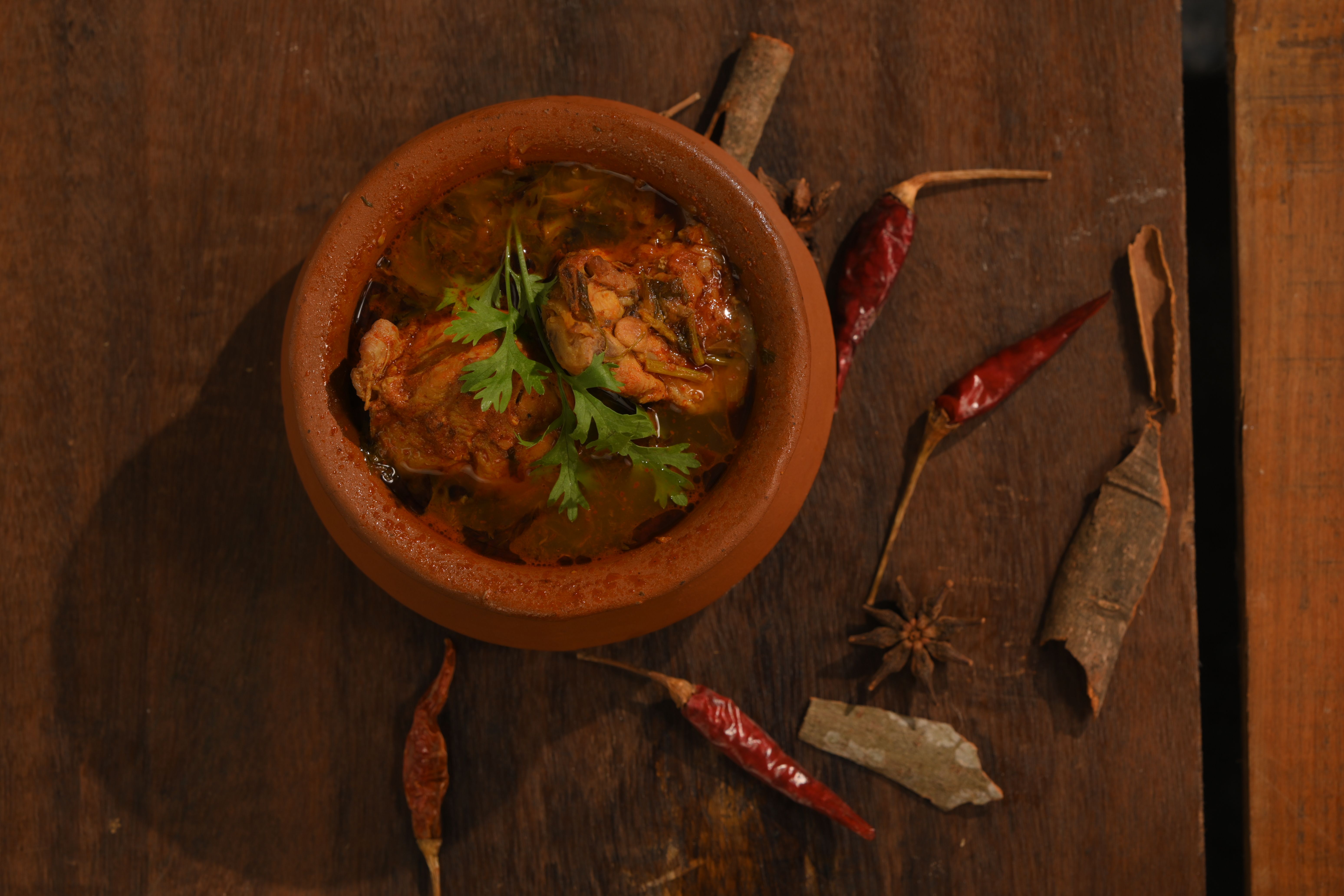 Traditional Kerala Chicken Curry in Clay Pot · Free Stock Photo