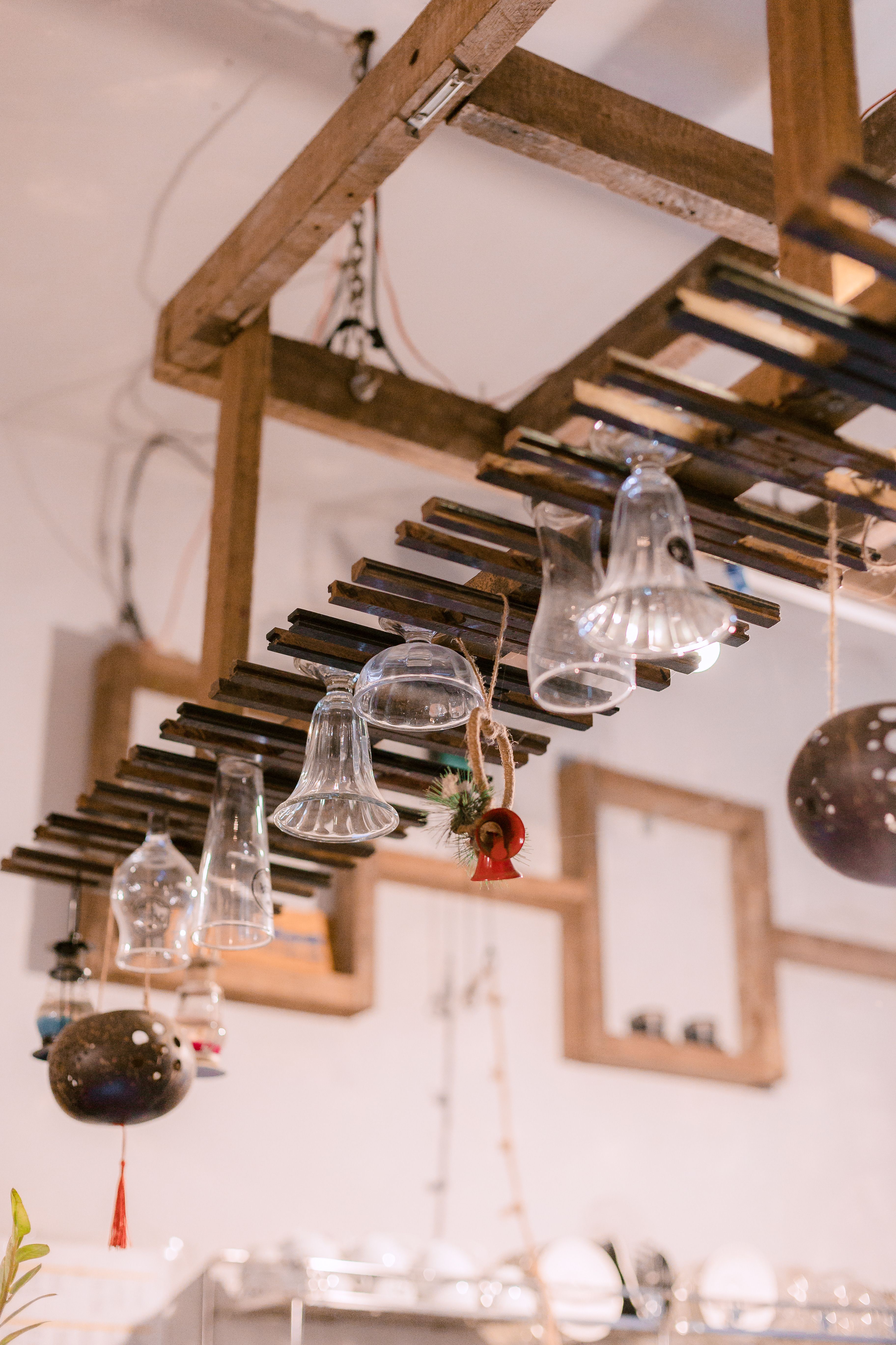 Artistic Ceiling Decor with Hanging Glass Bells · Free Stock Photo