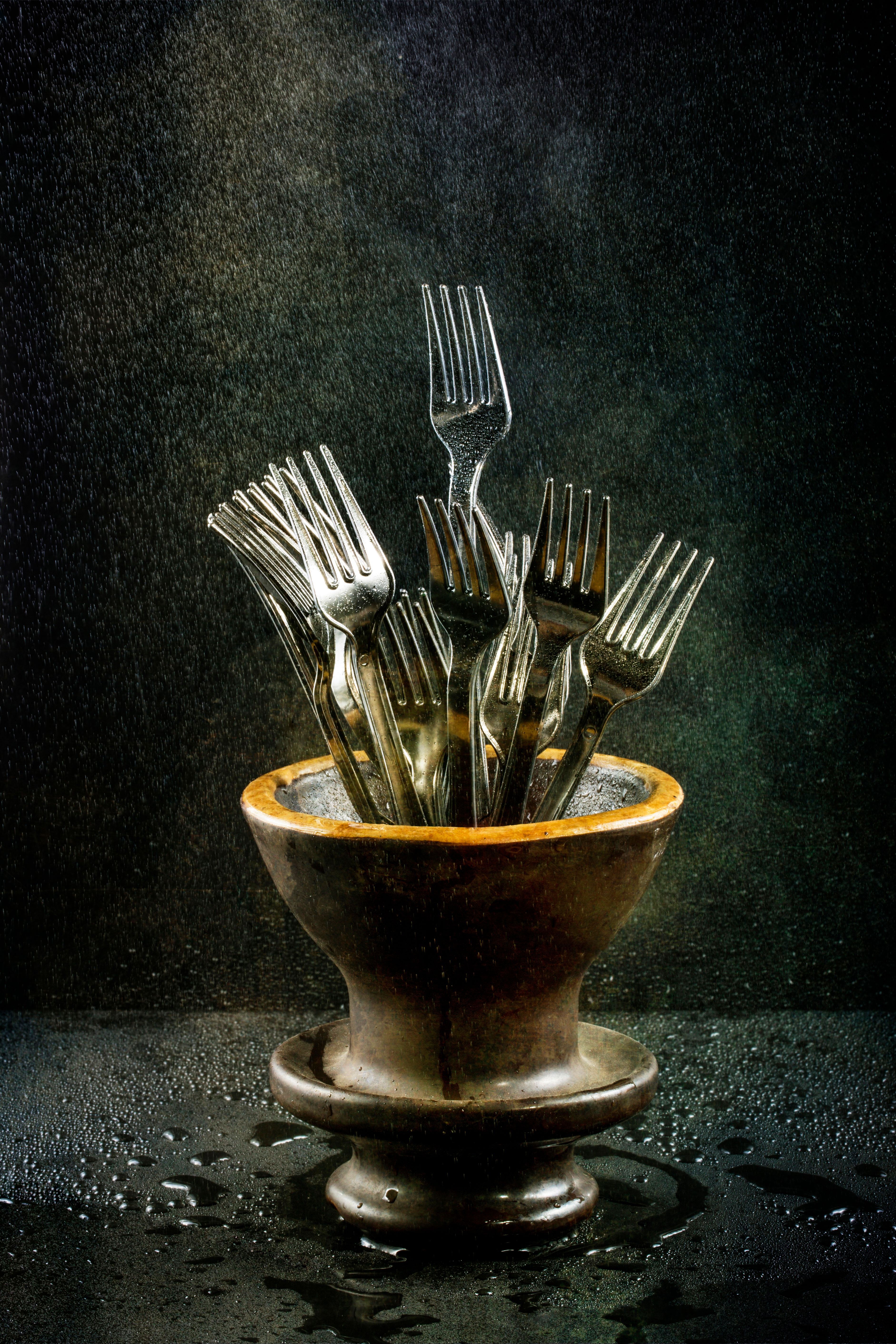 Artistic Display of Metal Forks in Rustic Bowl · Free Stock Photo