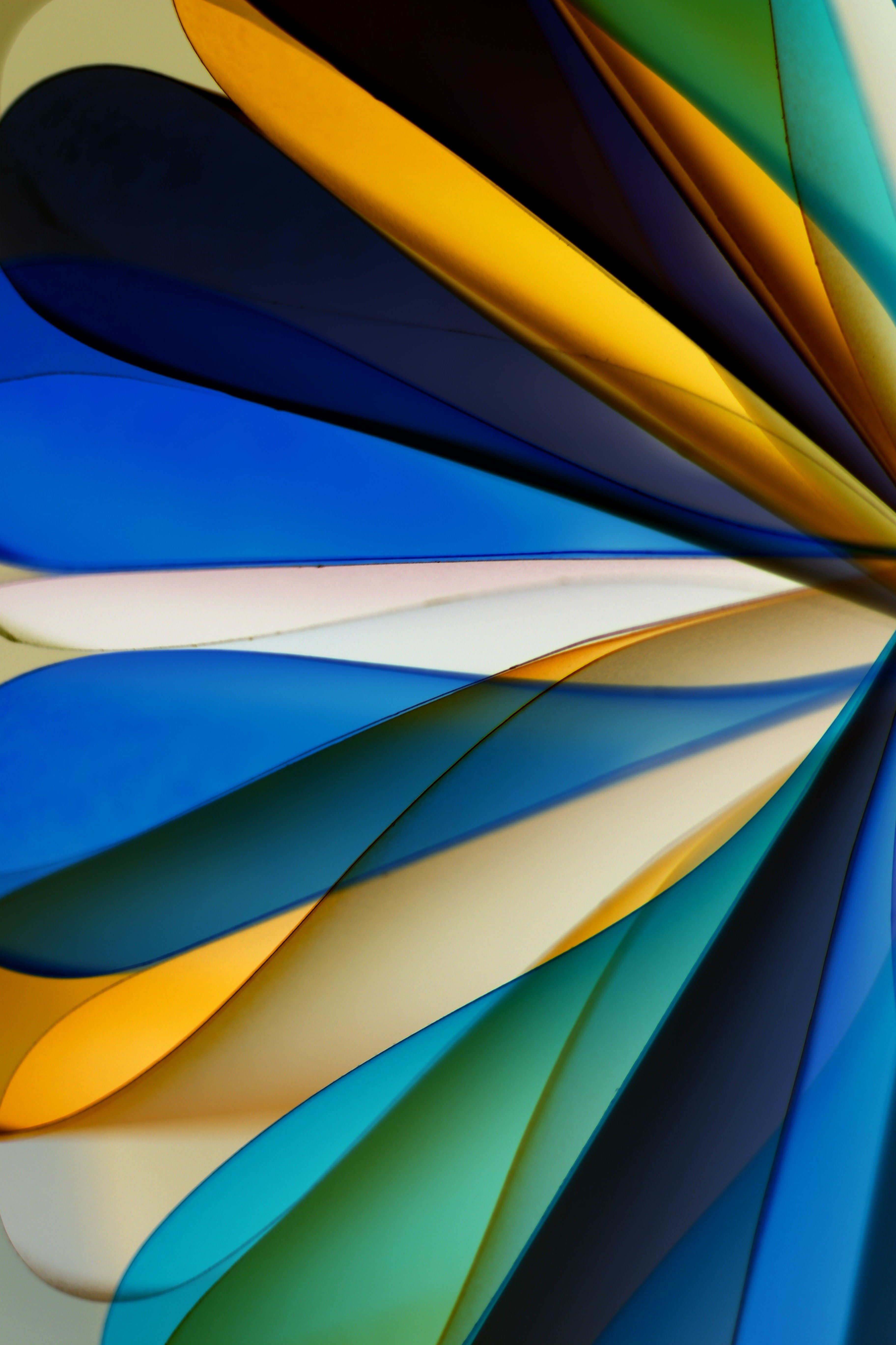 Colorful Abstract Paper Fan Design in Blue and Gold · Free Stock Photo