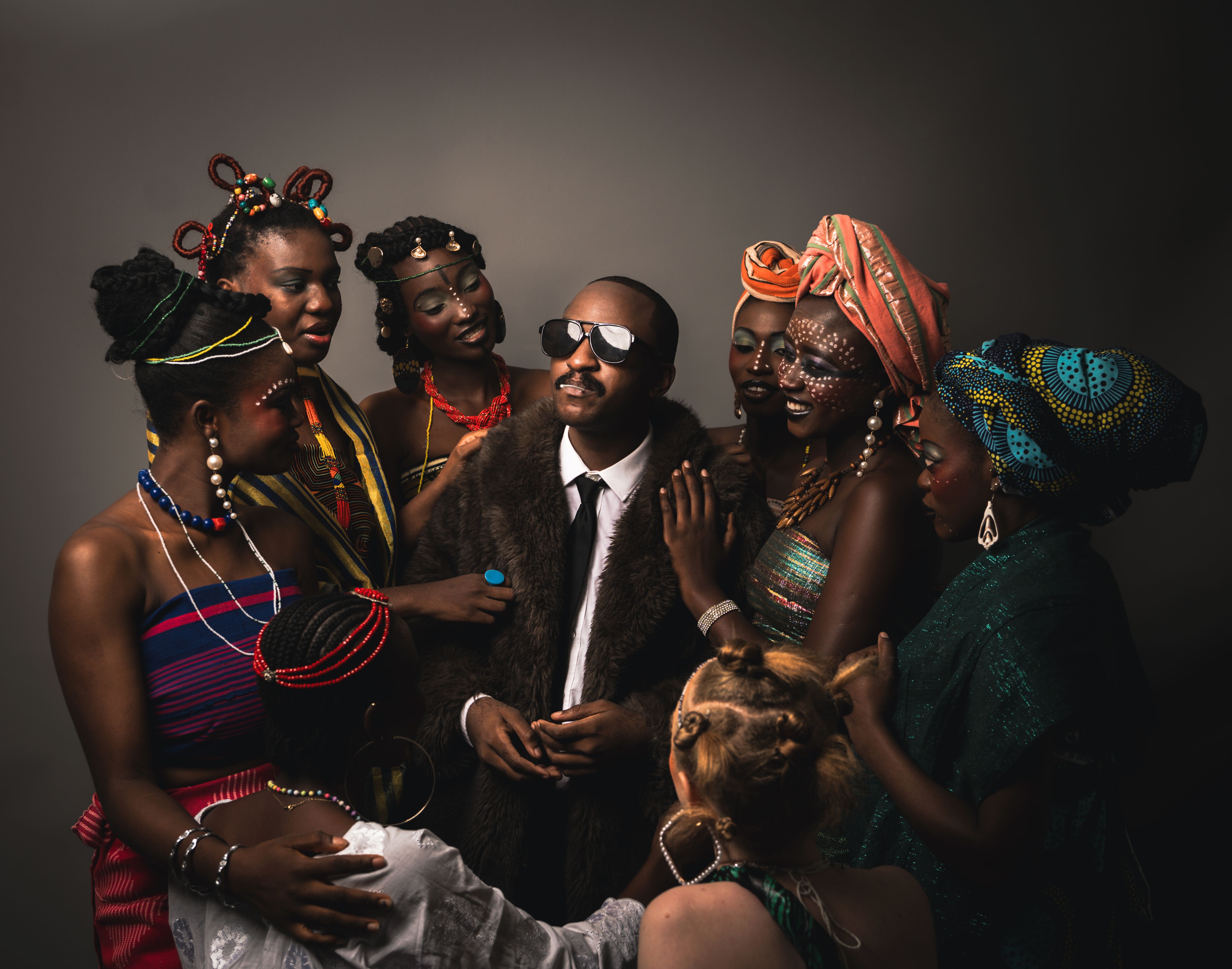 Elegant Group in Vibrant Cultural Attire · Free Stock Photo
