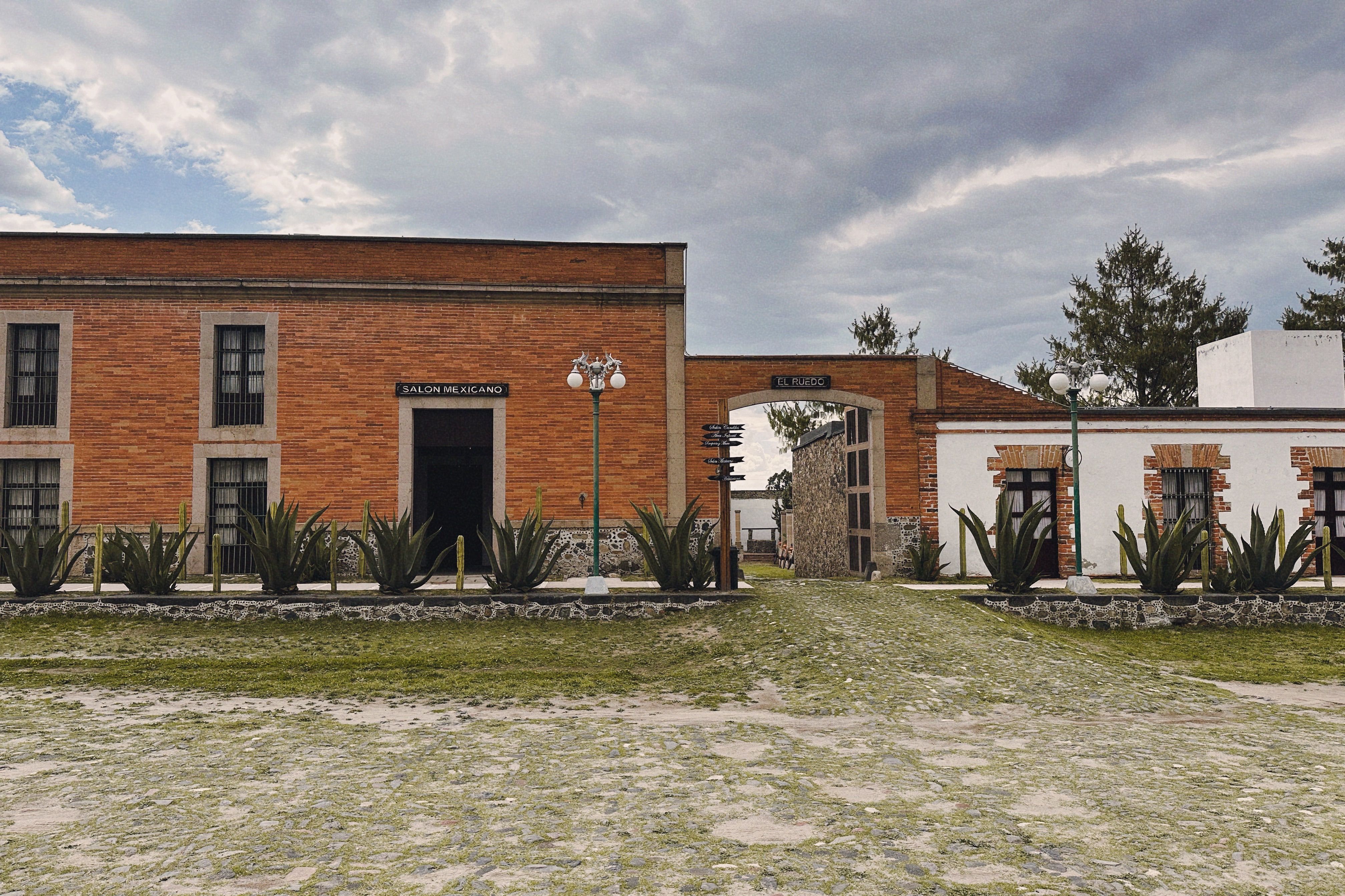 Historic Mexican Building with Brick and Stucco · Free Stock Photo