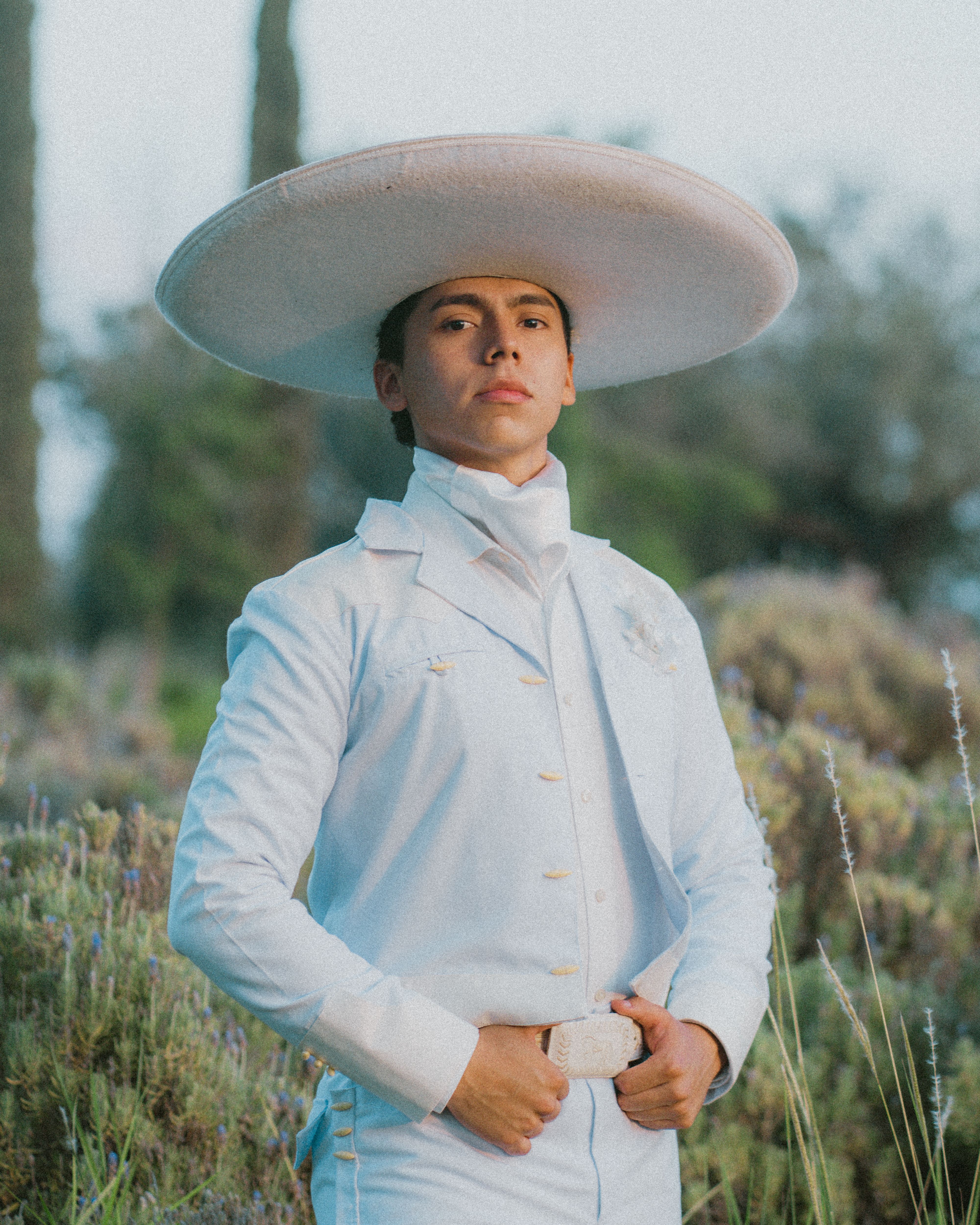 Elegant Traditional Mexican Charro Attire Outdoors · Free Stock Photo