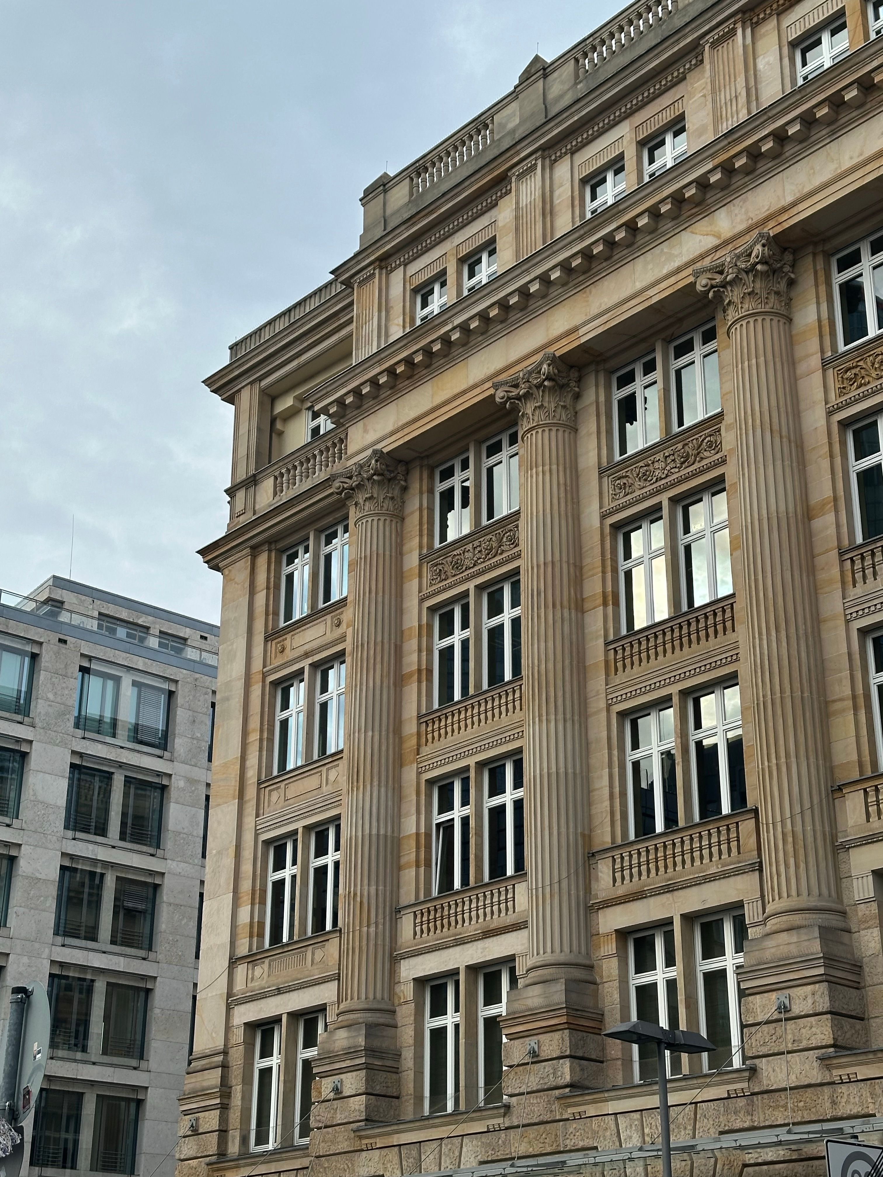 Classic European Architectural Facade with Columns · Free Stock Photo