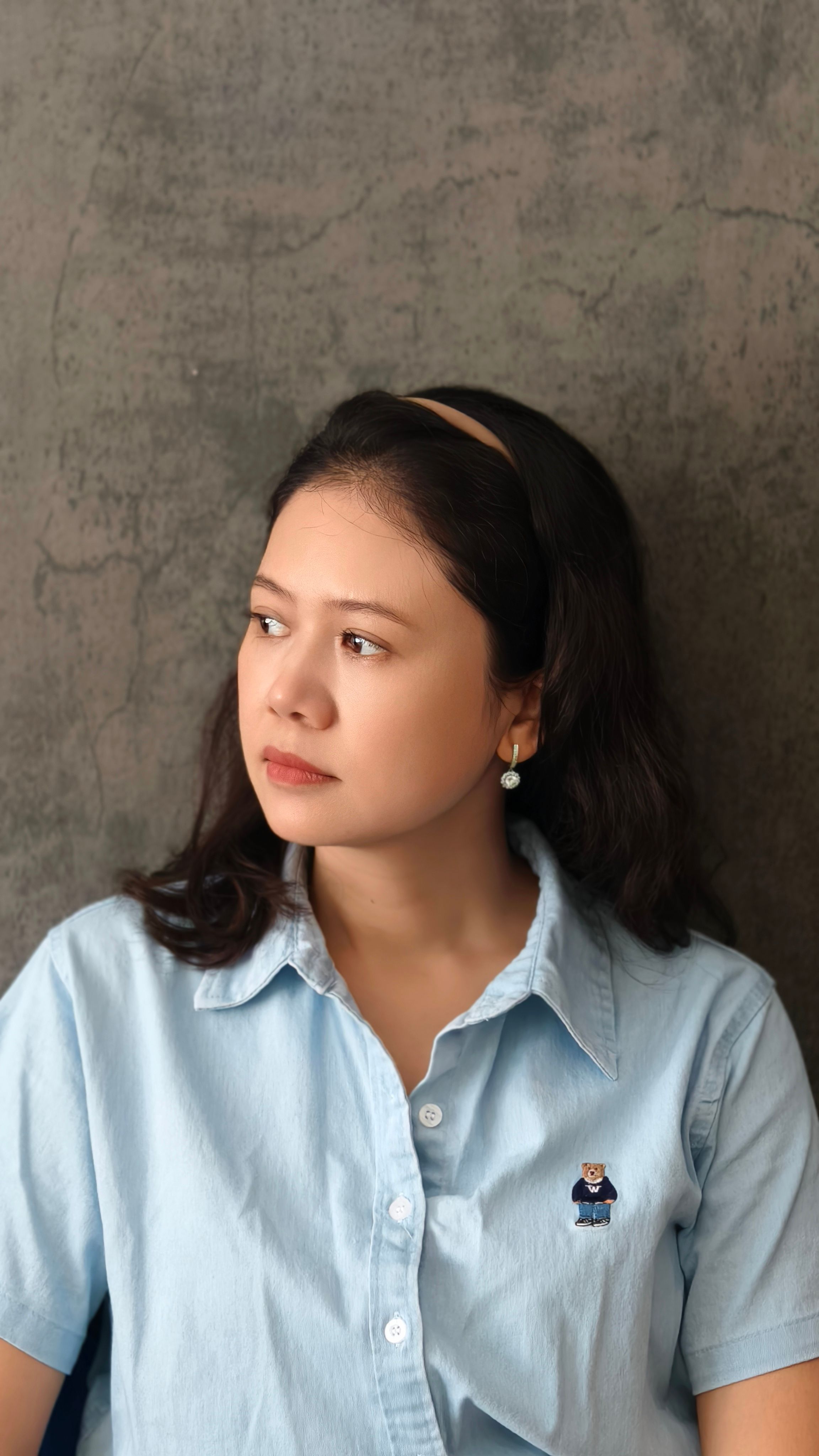 Thoughtful Woman Portrait with Soft Expression · Free Stock Photo