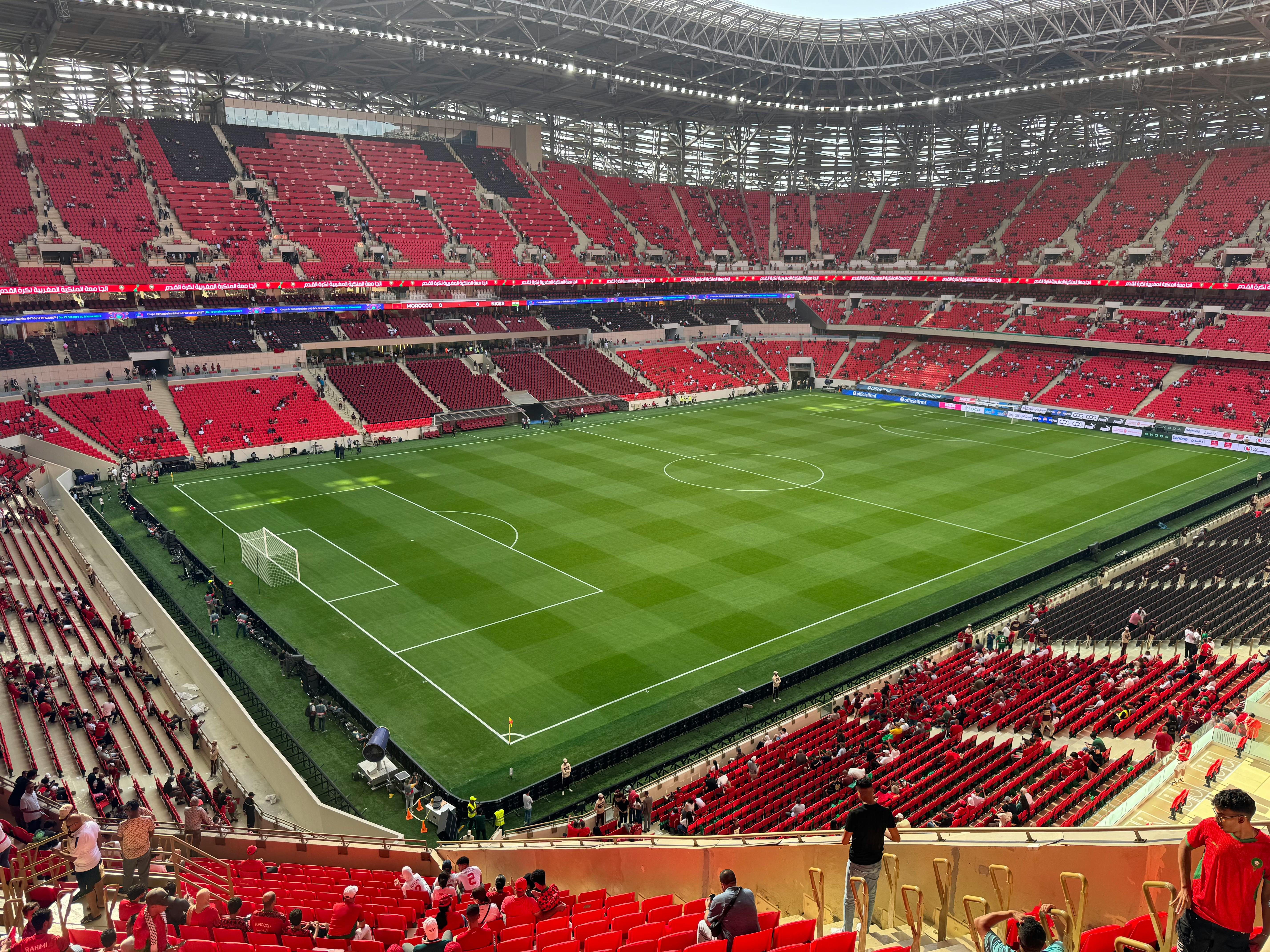Aerial View of Empty Stadium with Red Seats · Free Stock Photo