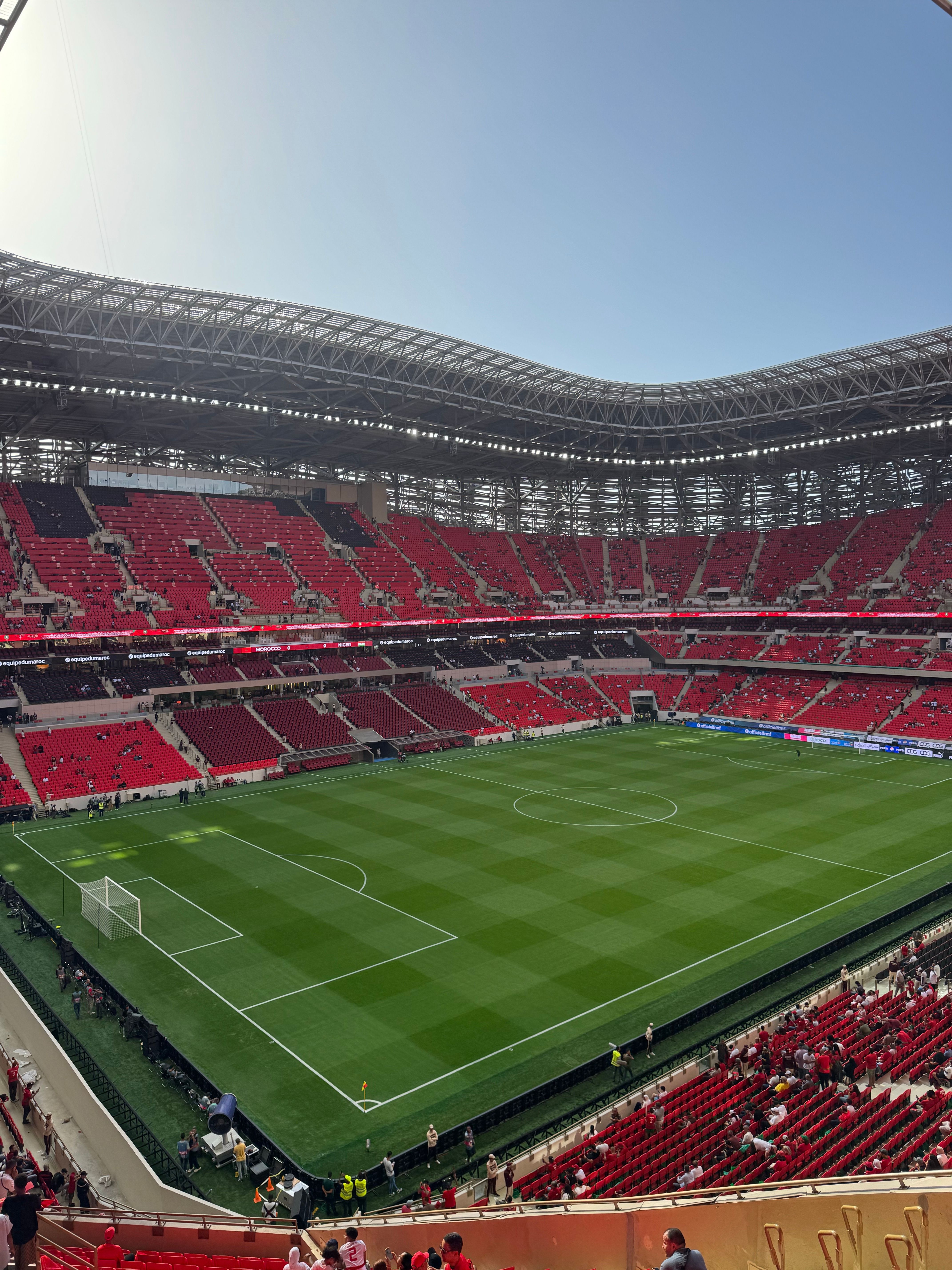 Vibrant Modern Stadium During a Daytime Event · Free Stock Photo