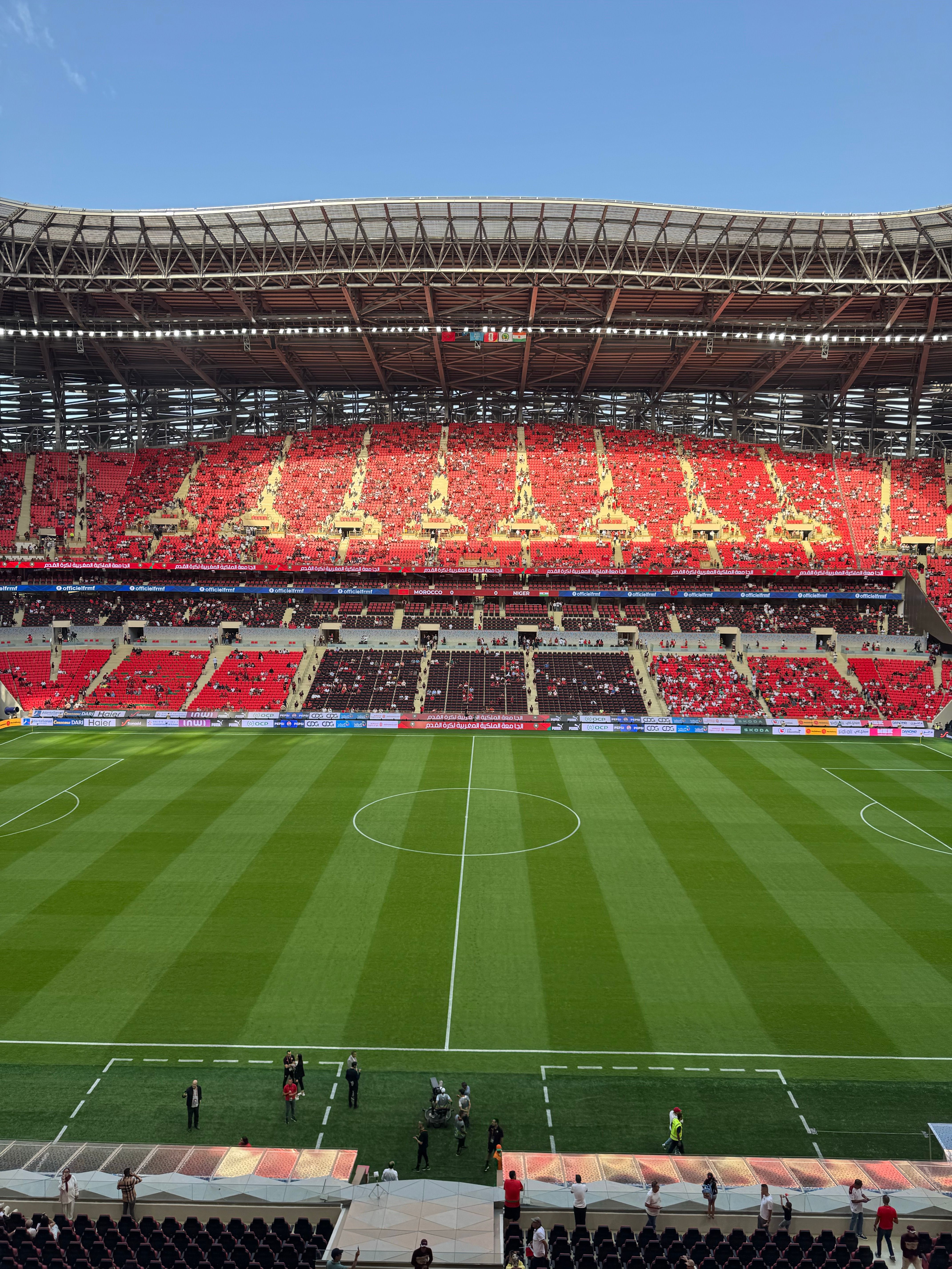 Vibrant Football Stadium in Full View · Free Stock Photo