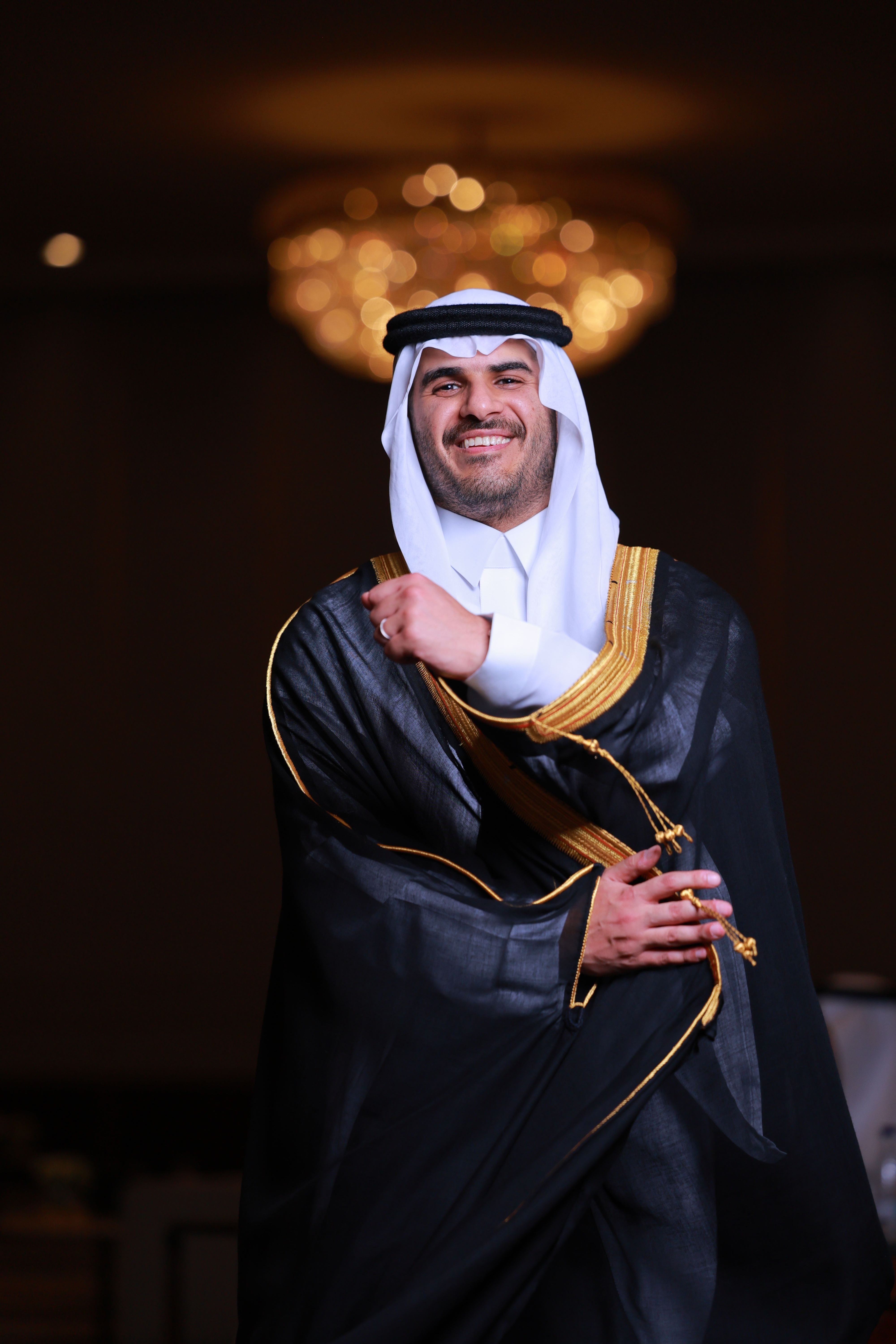 Smiling Middle Eastern Man in Traditional Attire · Free Stock Photo