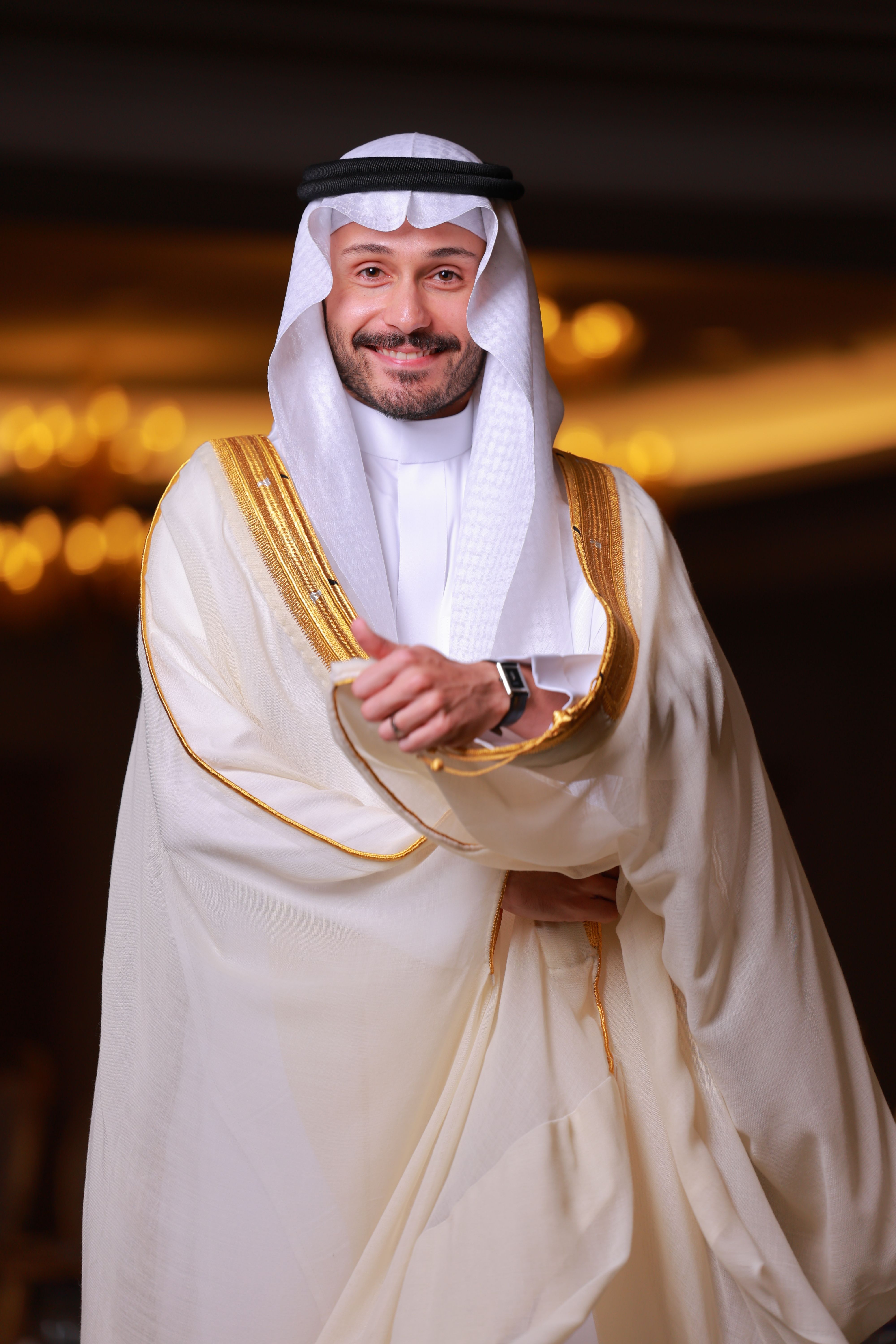 Smiling Middle Eastern Man in Traditional Attire · Free Stock Photo