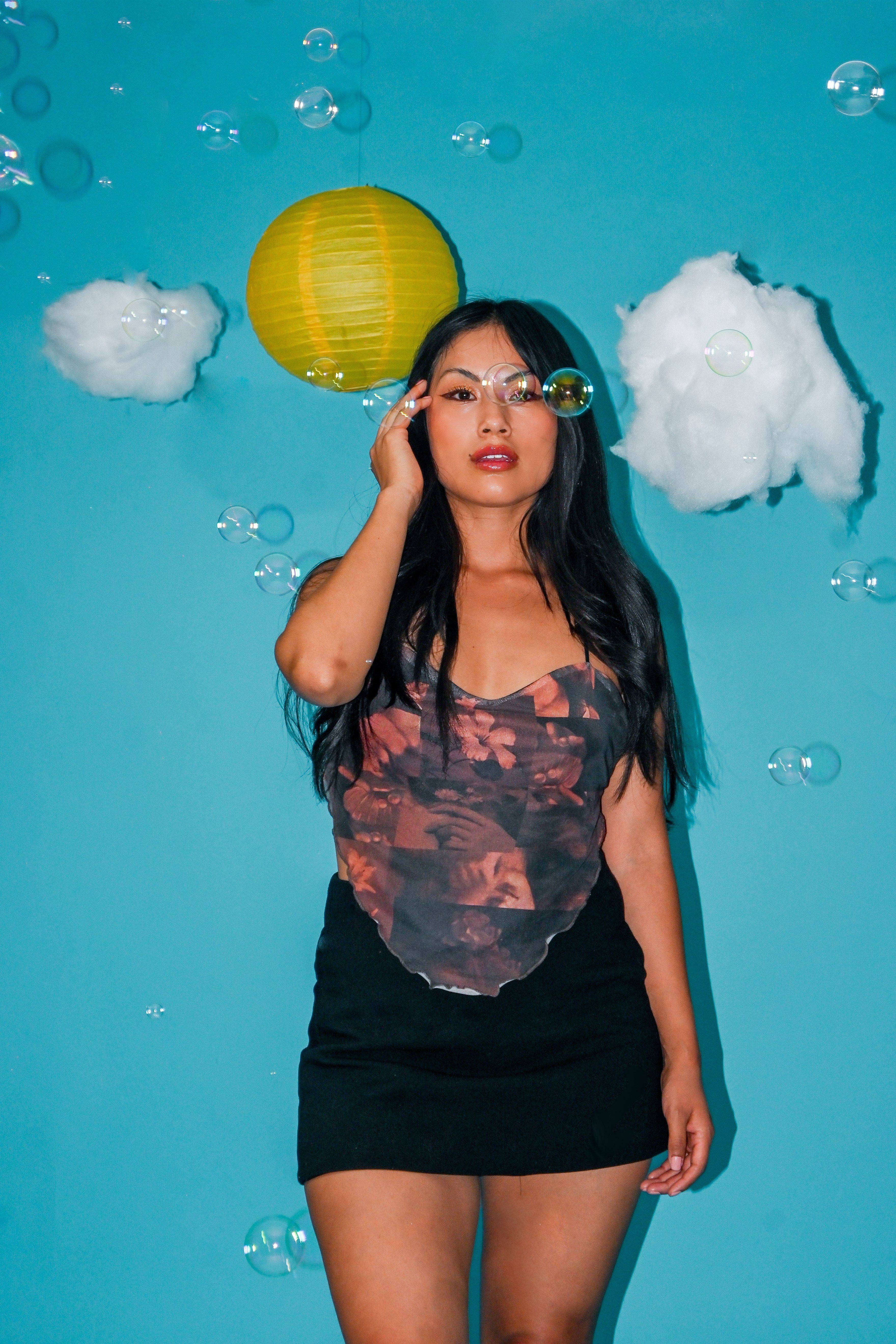 Portrait of Woman with Bubbles and Blue Background · Free Stock Photo