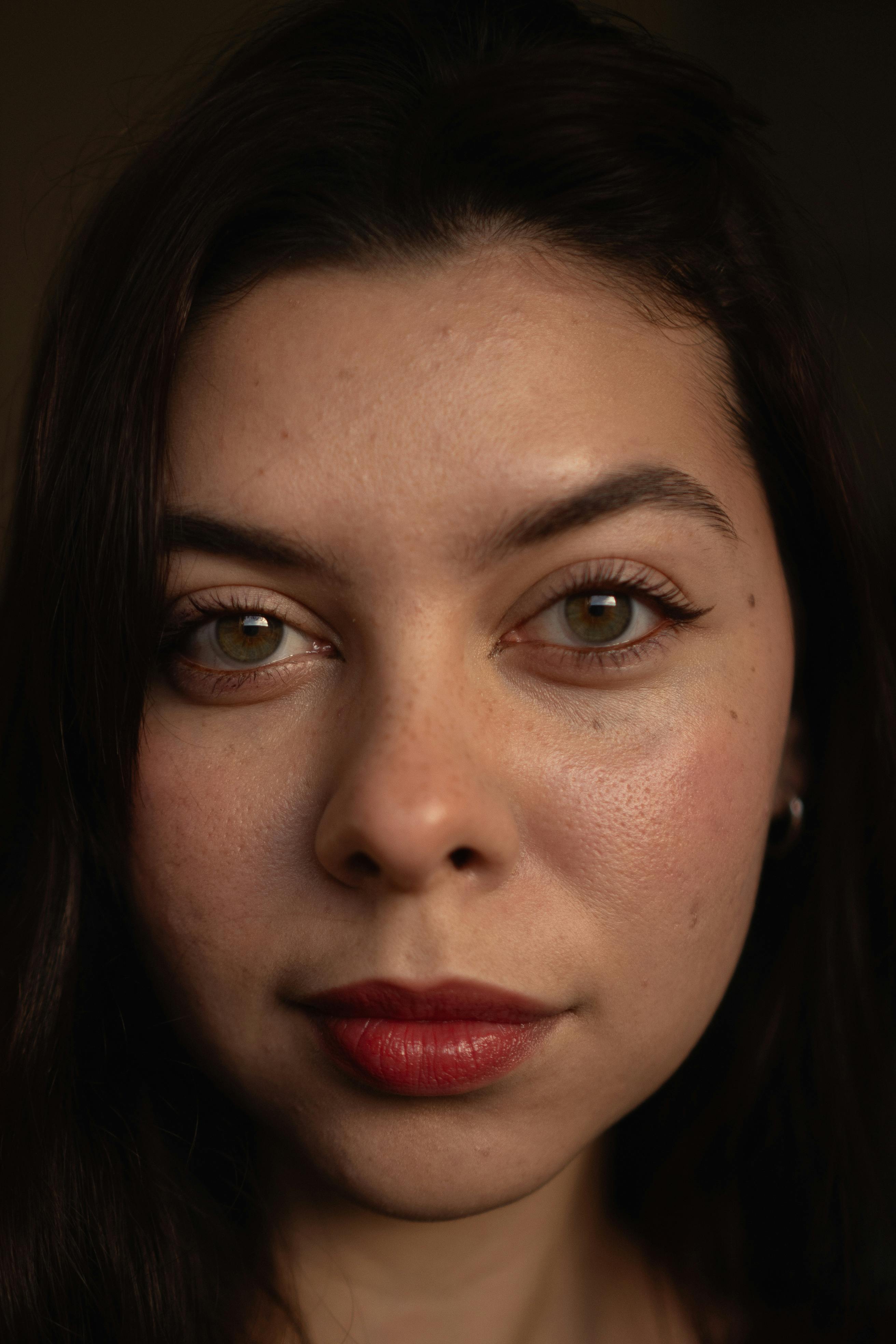 Close-Up Portrait of a Woman with Red Lips · Free Stock Photo