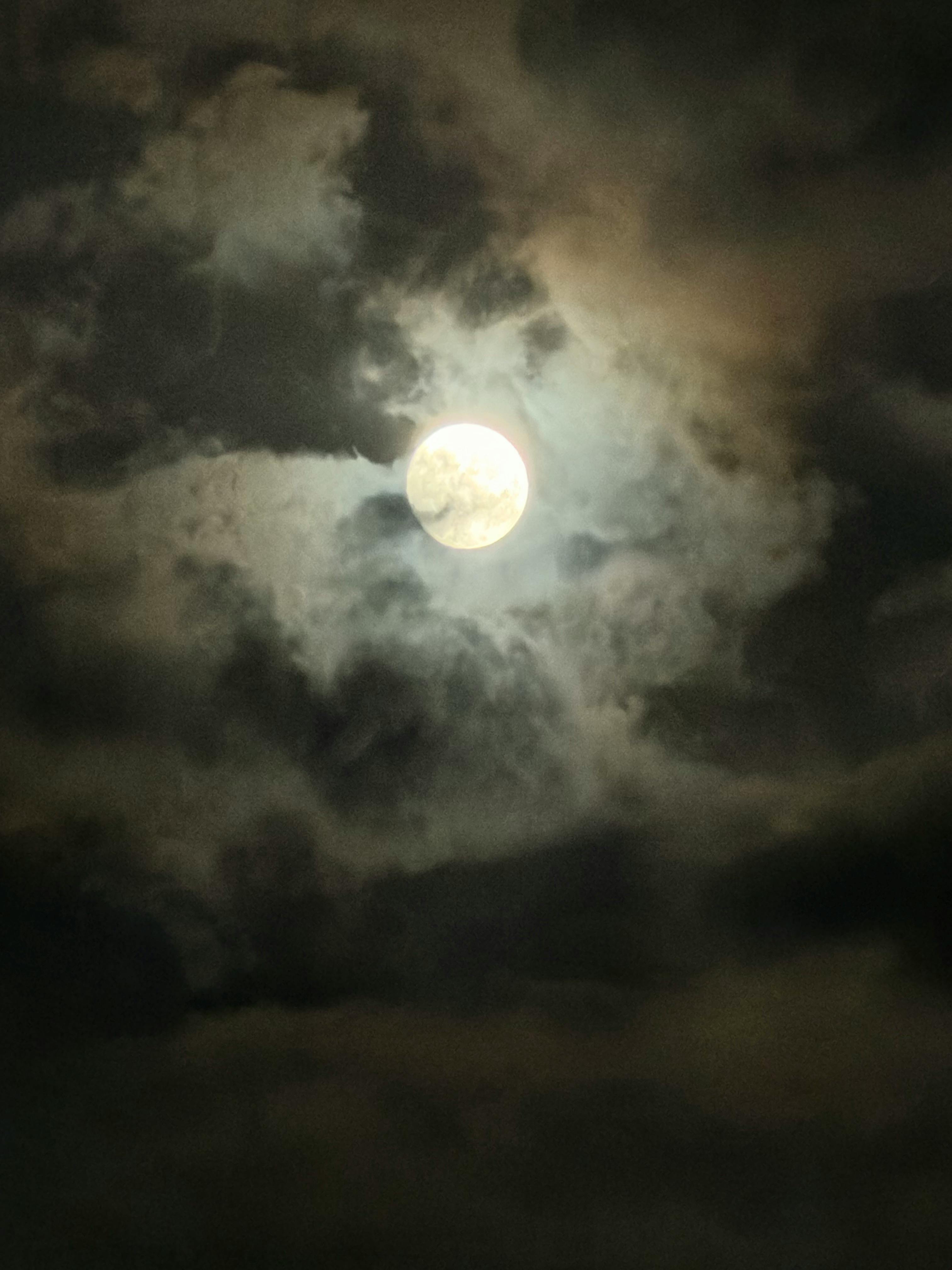 Full Moon Surrounded by Dramatic Clouds at Night · Free Stock Photo