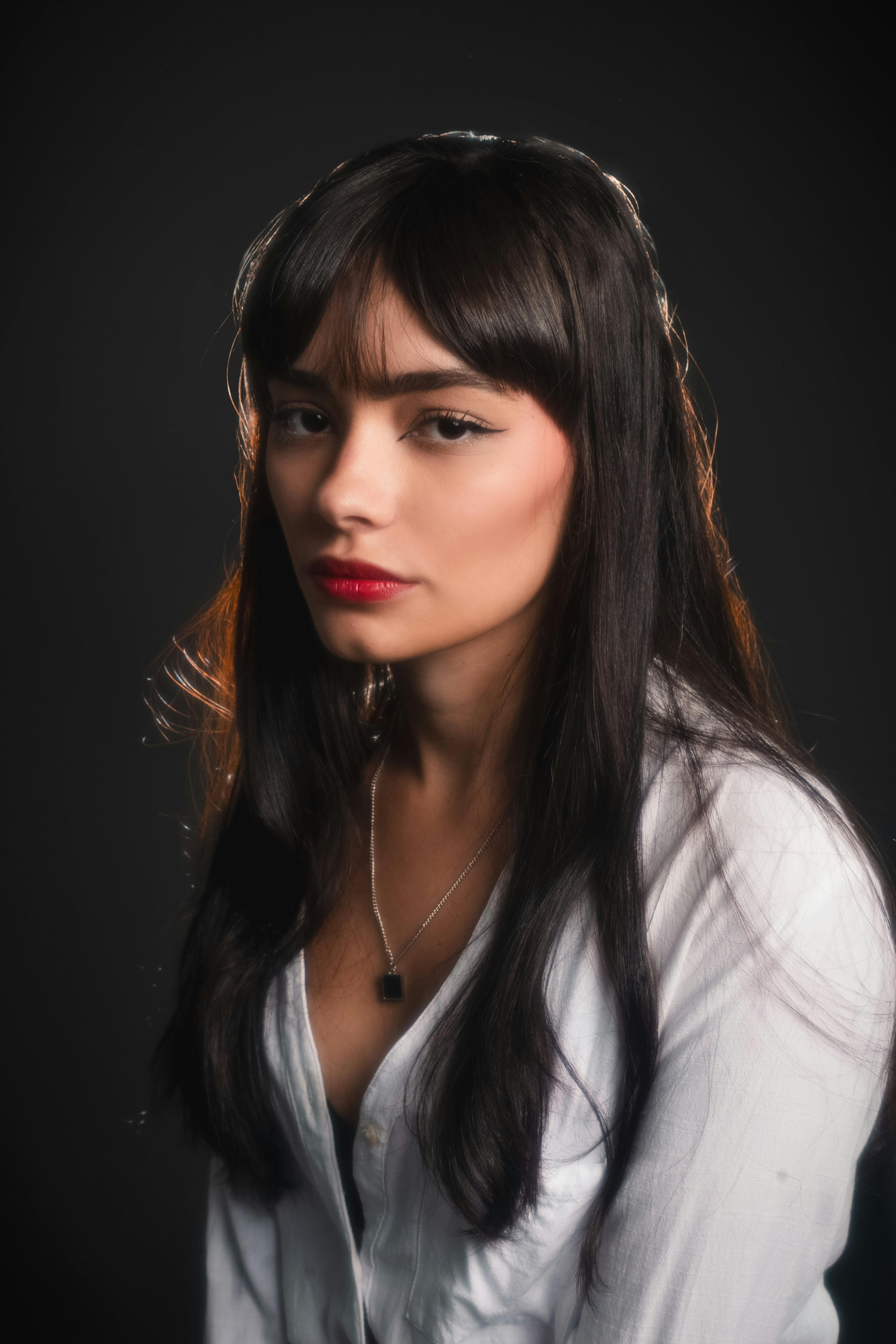 Portrait of a Woman in Studio Lighting · Free Stock Photo